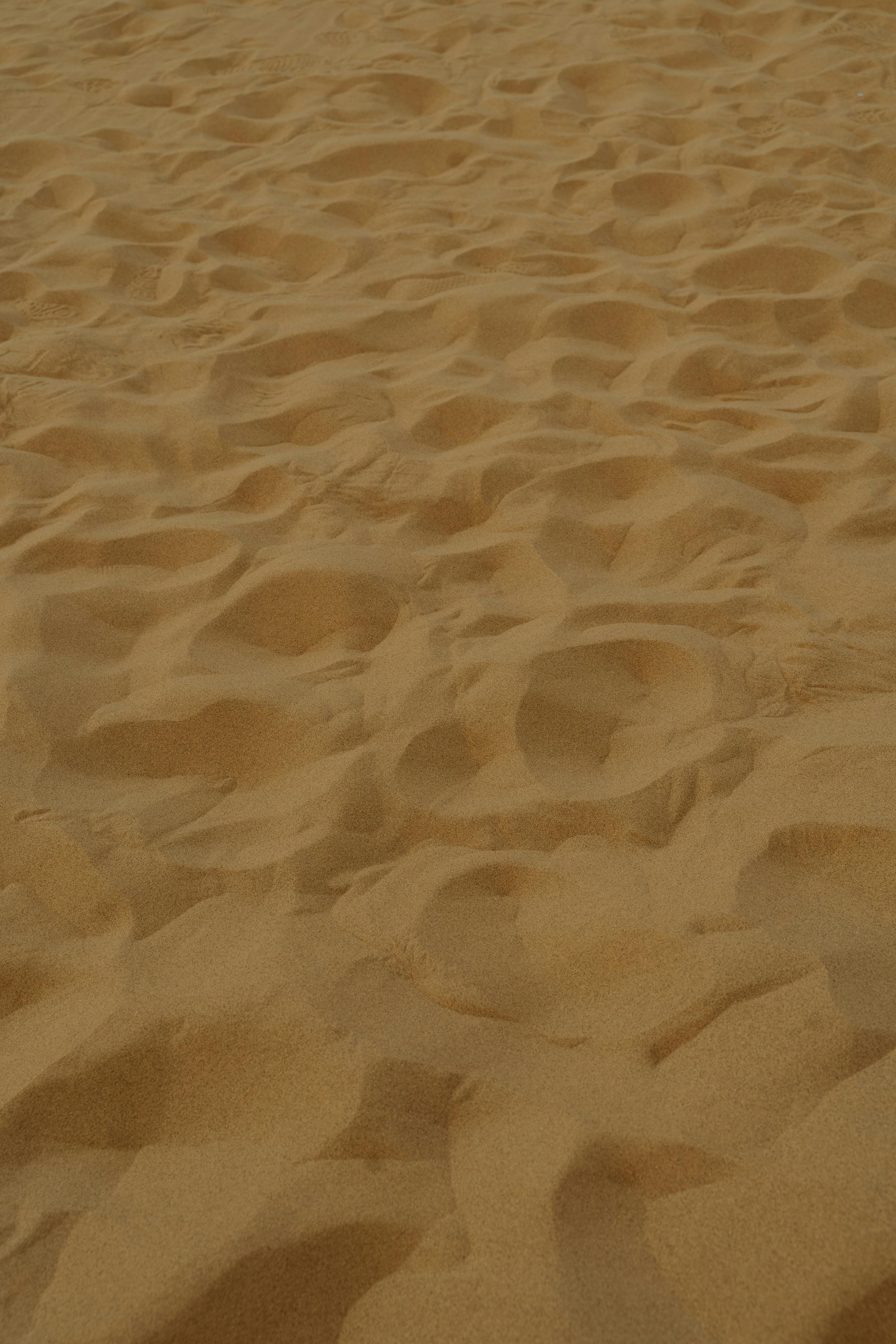 Close-up Photo of Sand Patterns · Free Stock Photo