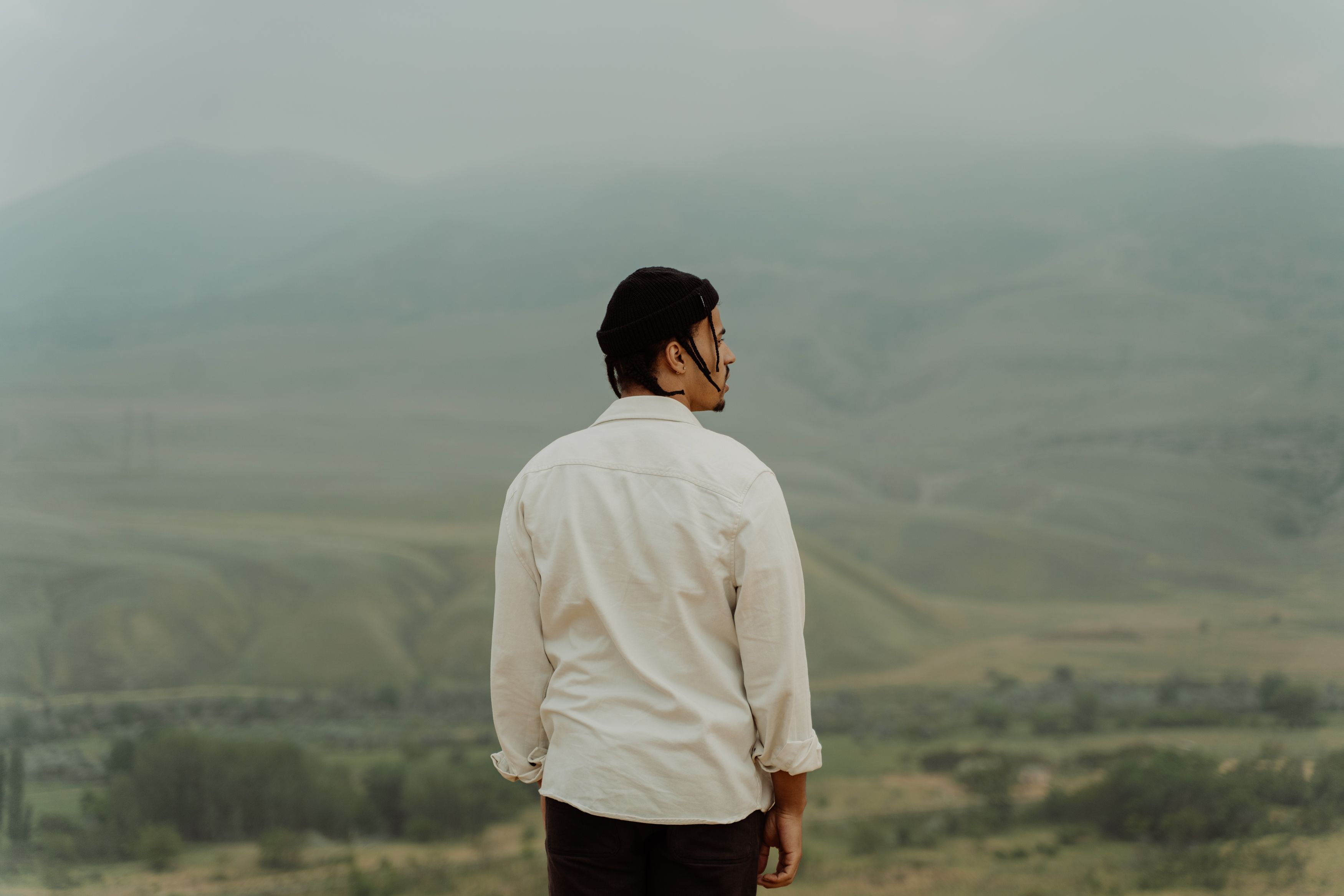 Backview of Stylish Man overlooking the View · Free Stock Photo