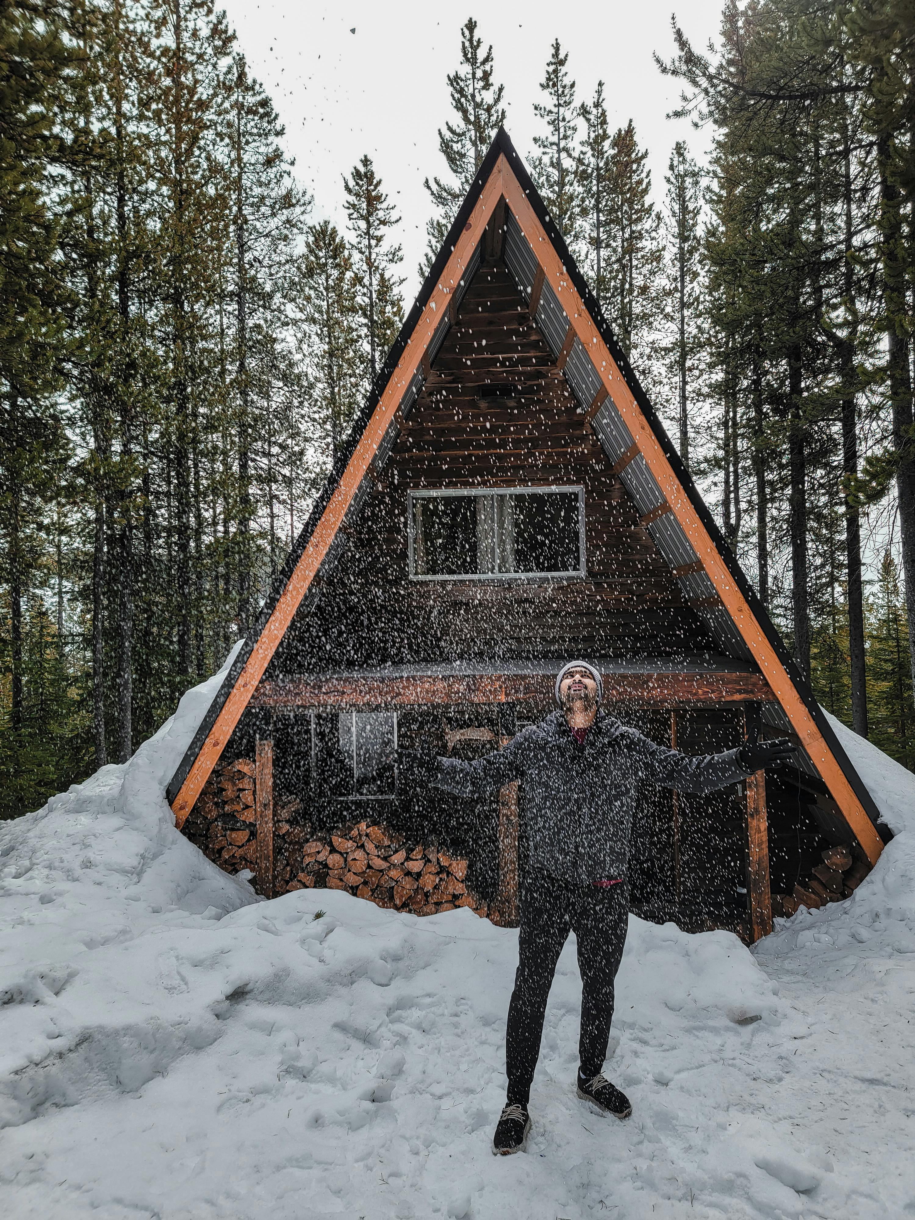 Man Looking at the Falling Snow · Free Stock Photo