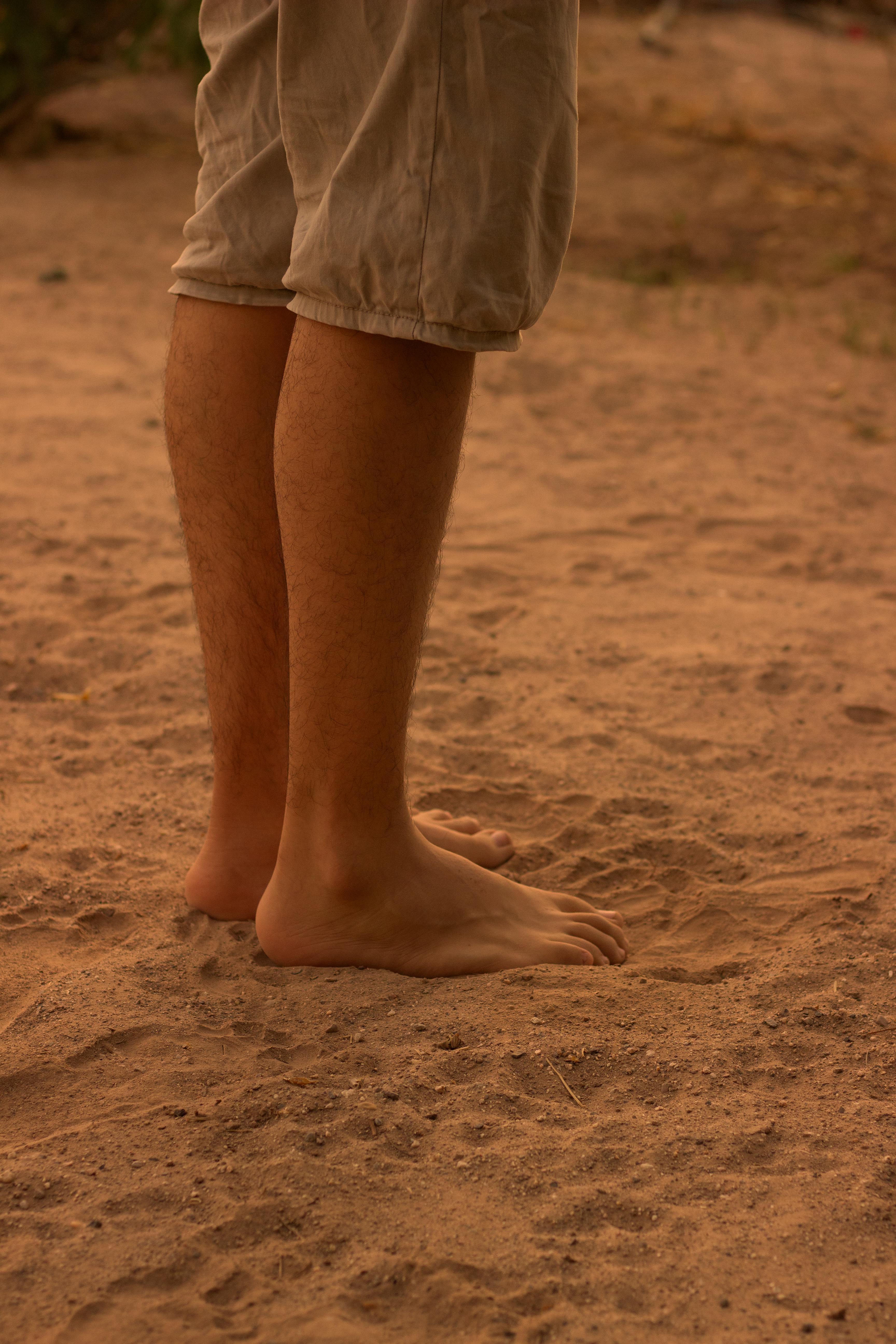 People Standing Barefoot on Sand · Free Stock Photo
