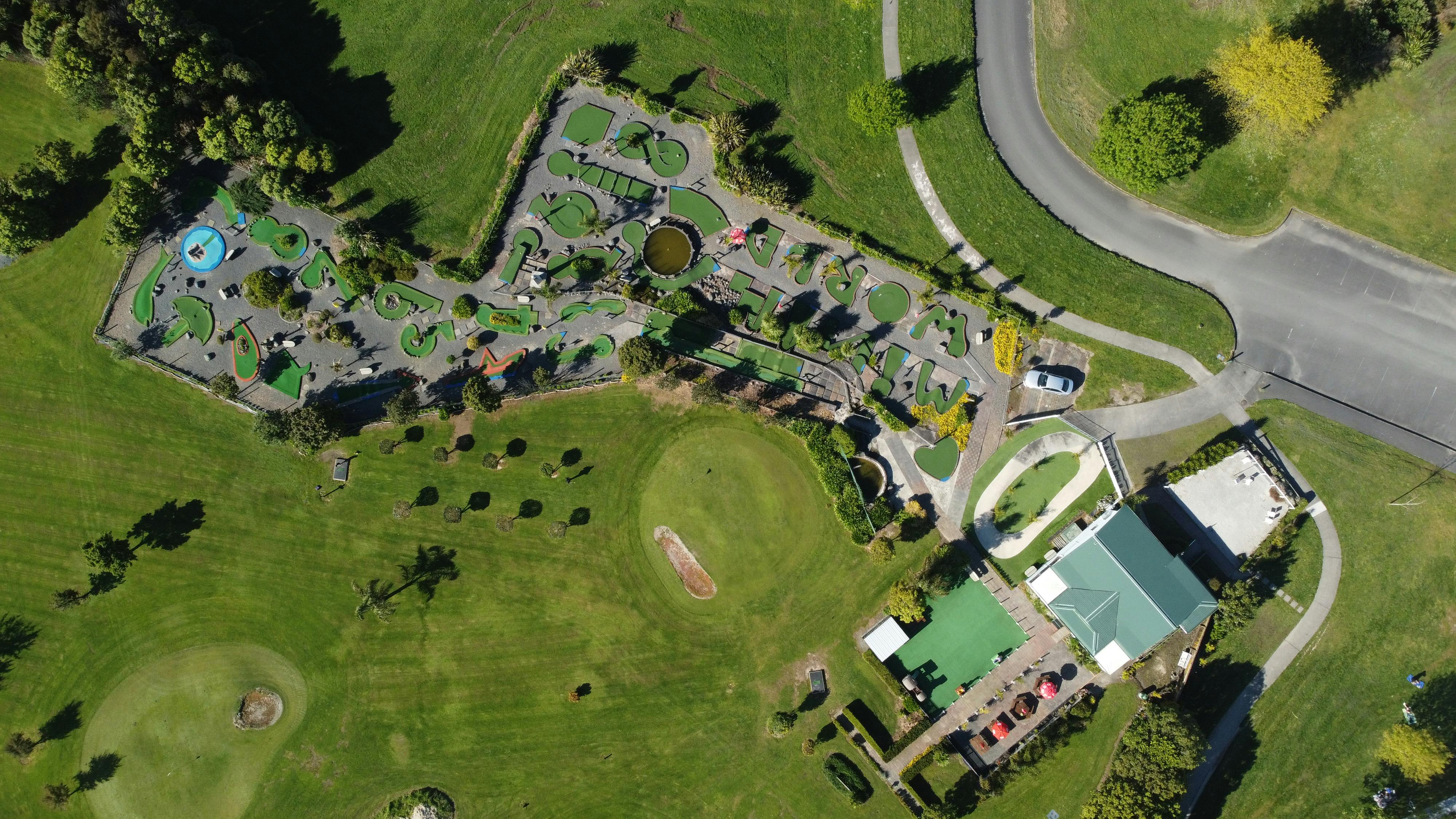 Bird's Eye View of Green Grass Field and Country Club · Free Stock Photo