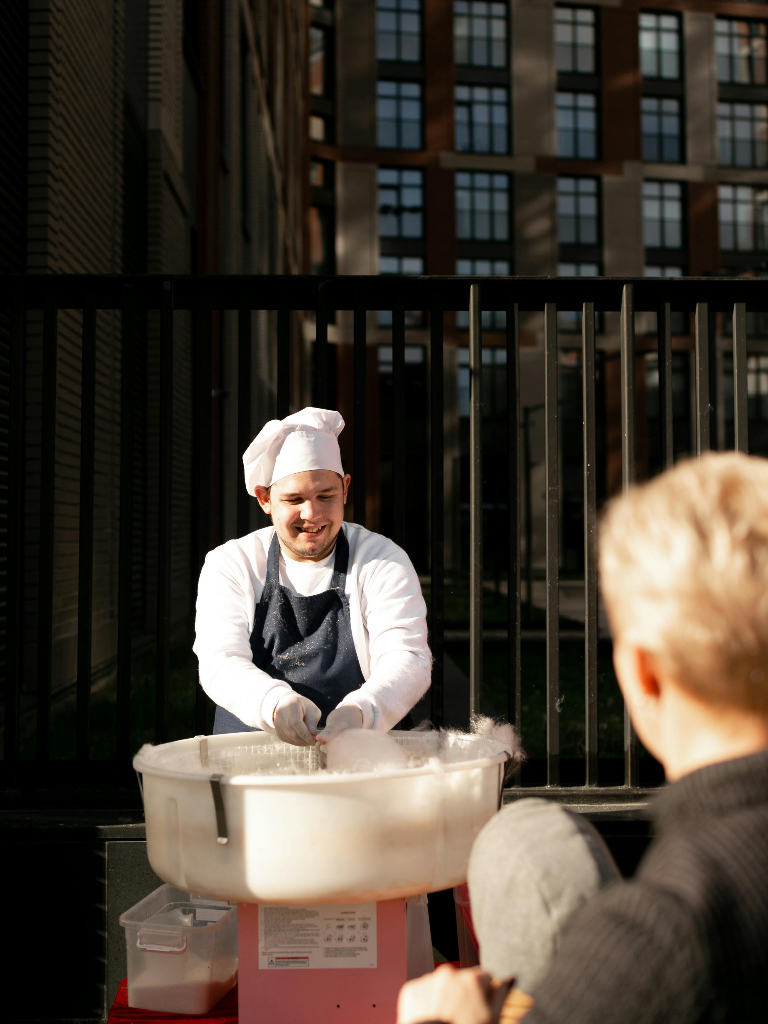 Photo of Chef in Making Cotton Candy · Free Stock Photo
