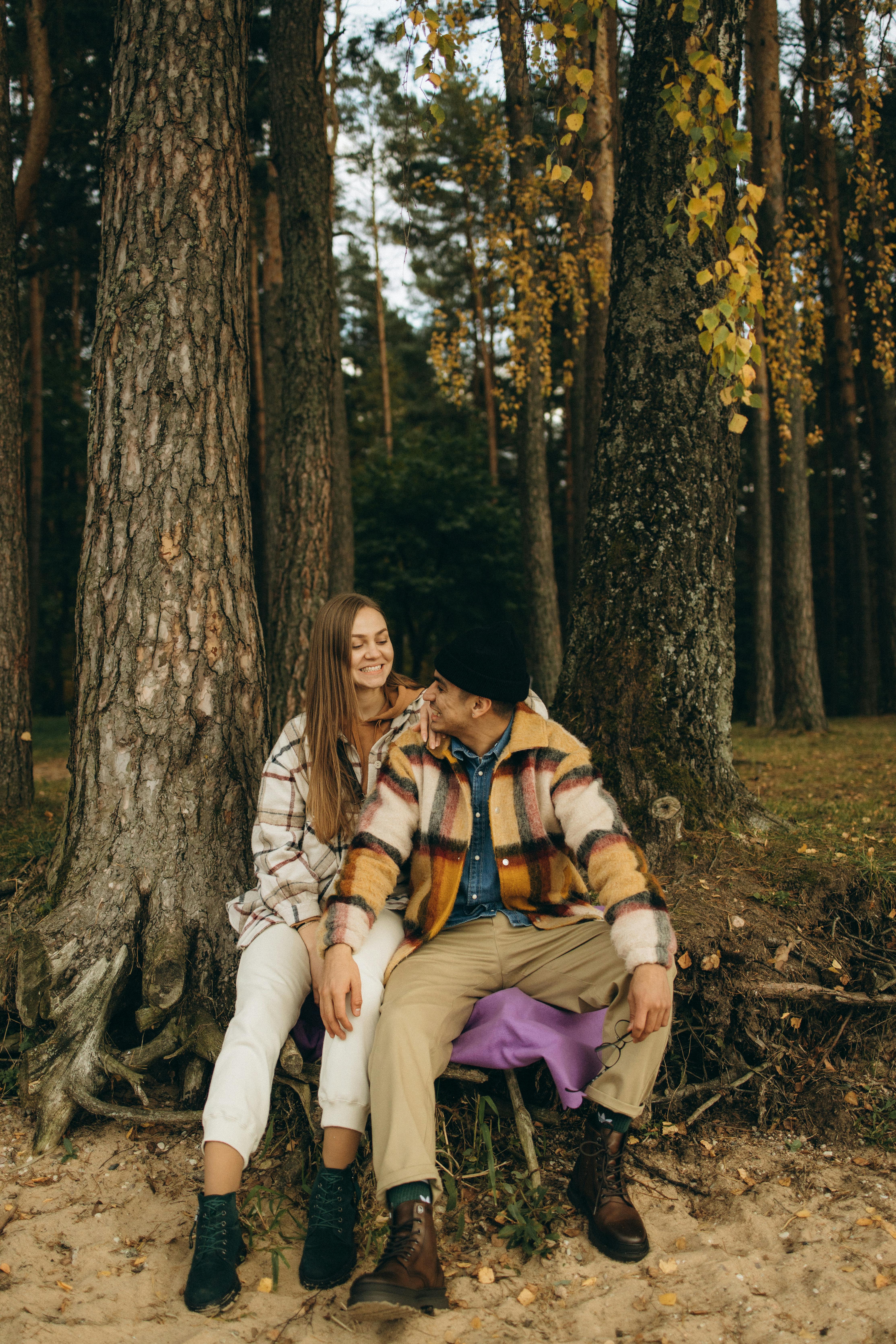 A Couple Sitting Beside the Tree · Free Stock Photo