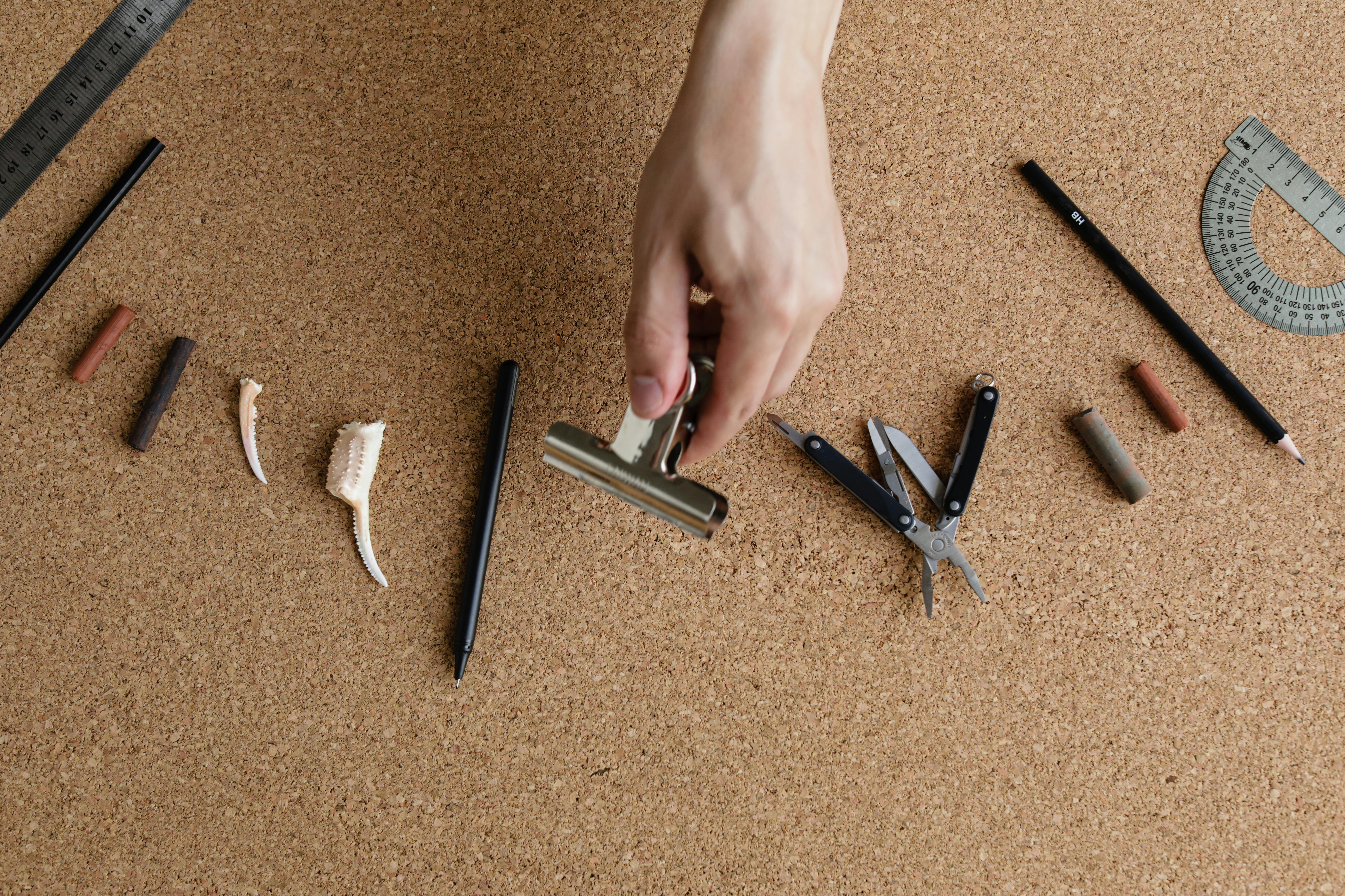 Hand Holding Paper Clip · Free Stock Photo