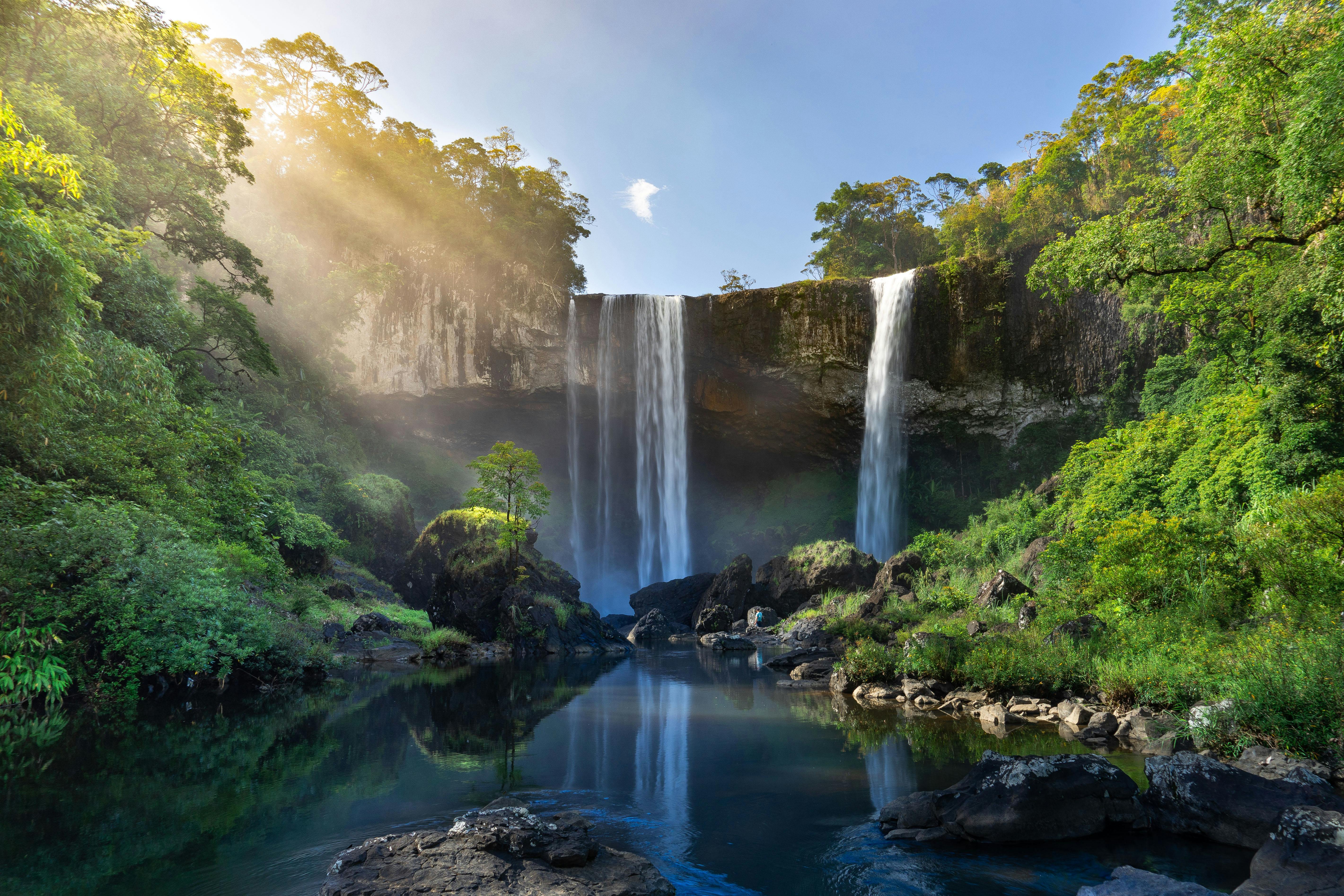 Scenic Waterfall at Sunset · Free Stock Photo