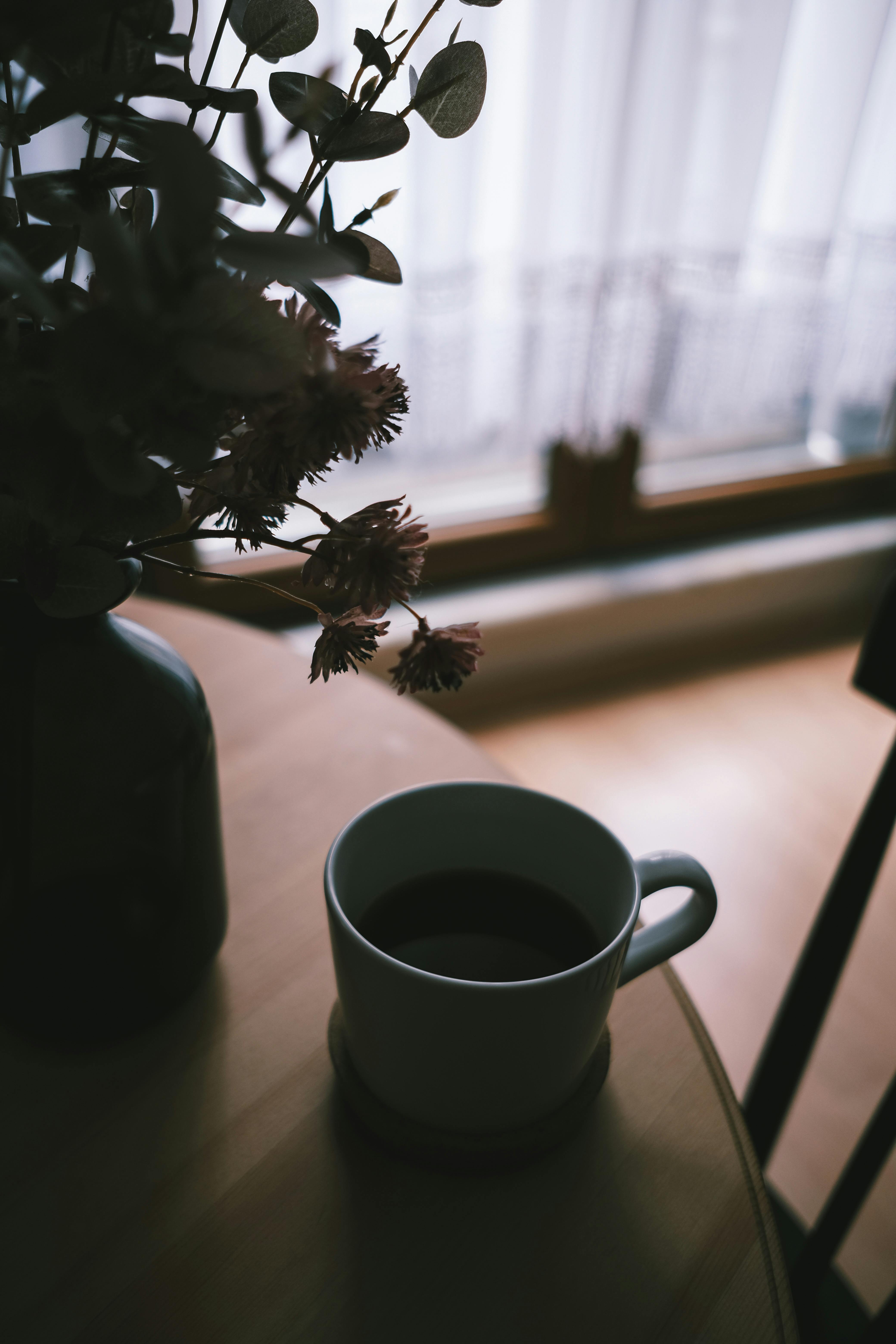 A Cup of Coffee on a Table · Free Stock Photo
