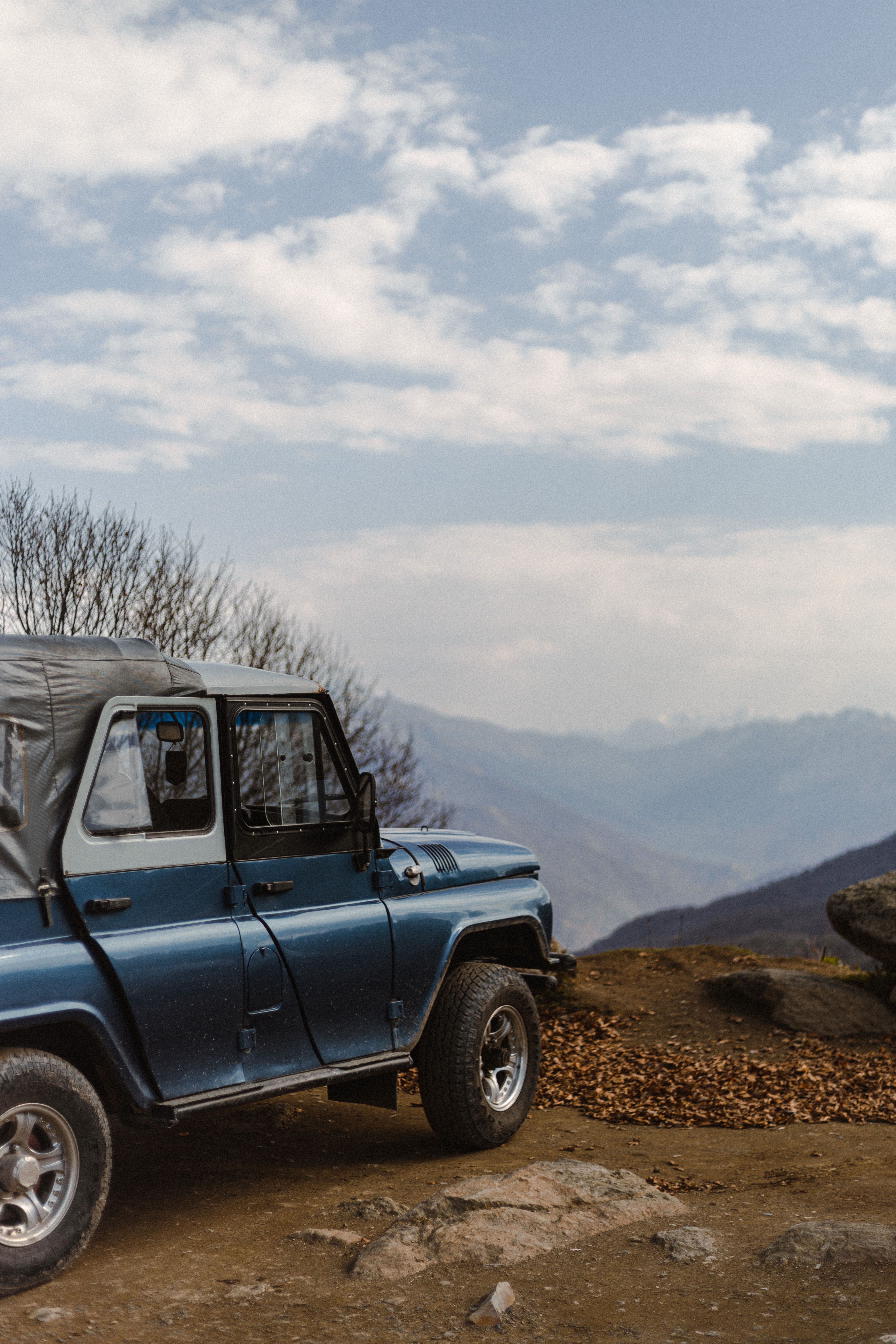 Car Against Cloudy Sky · Free Stock Photo