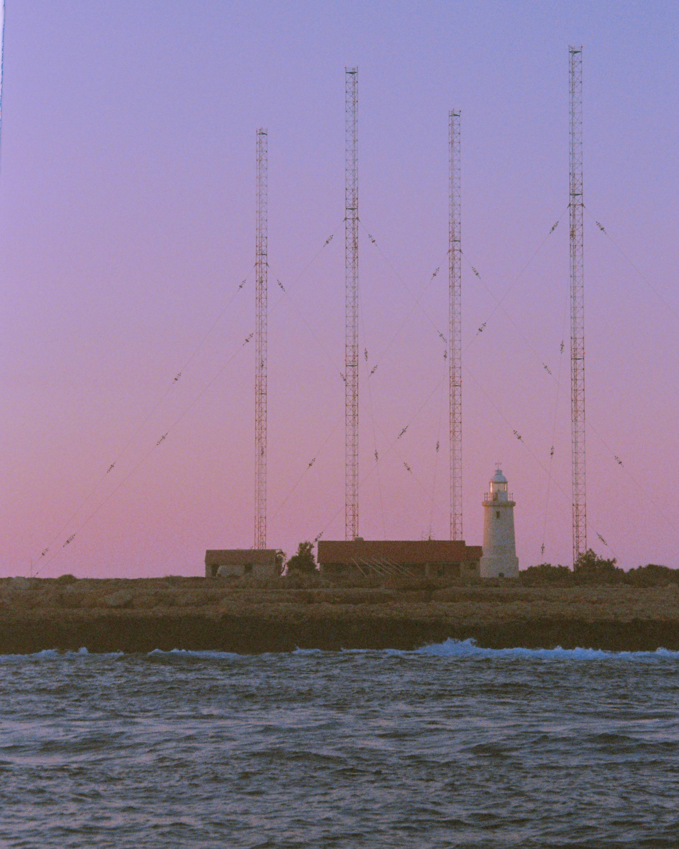 Transmitter Towers Near the Lighthouse · Free Stock Photo