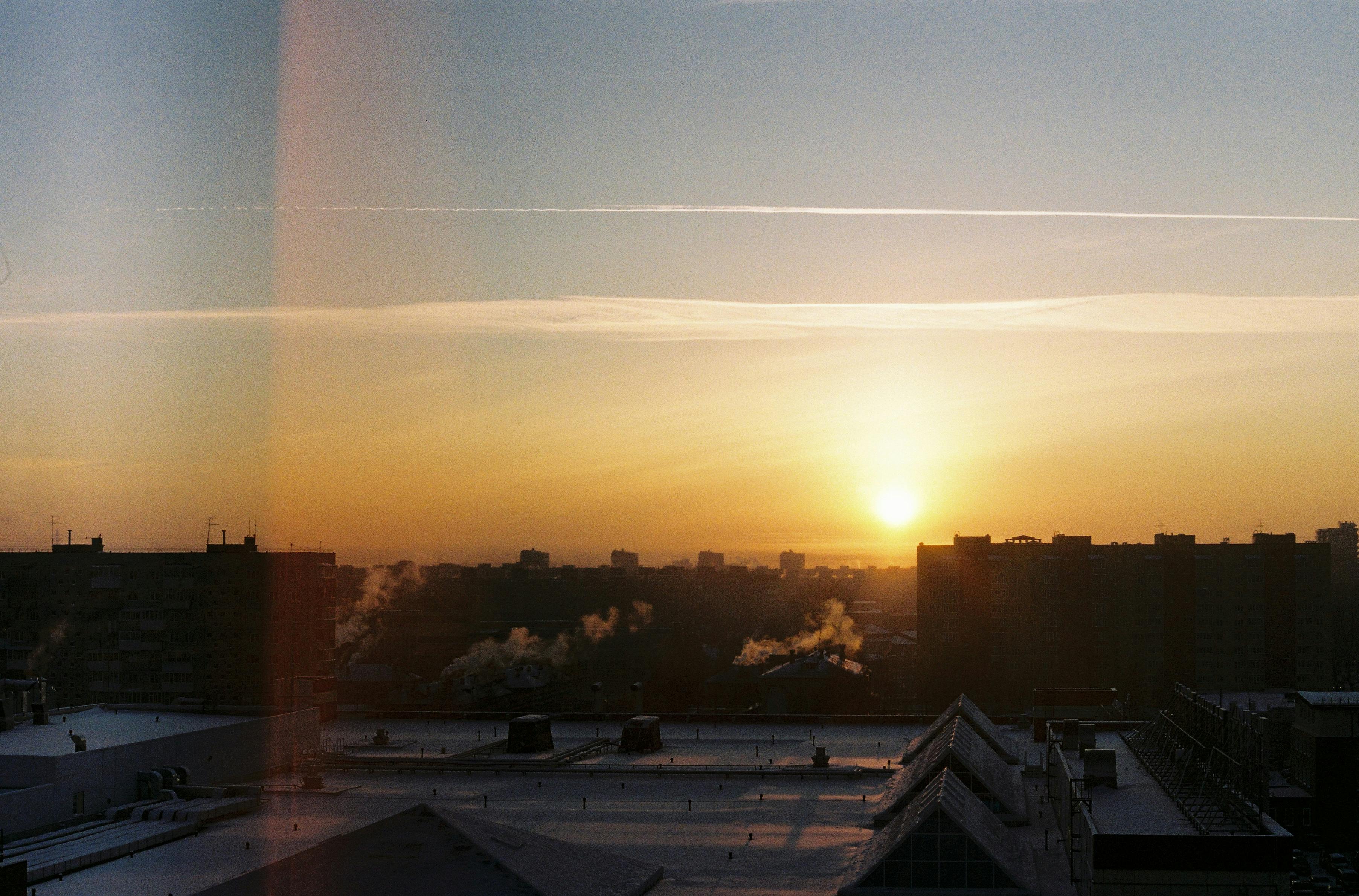 Silhouette of Buildings during Sunset · Free Stock Photo