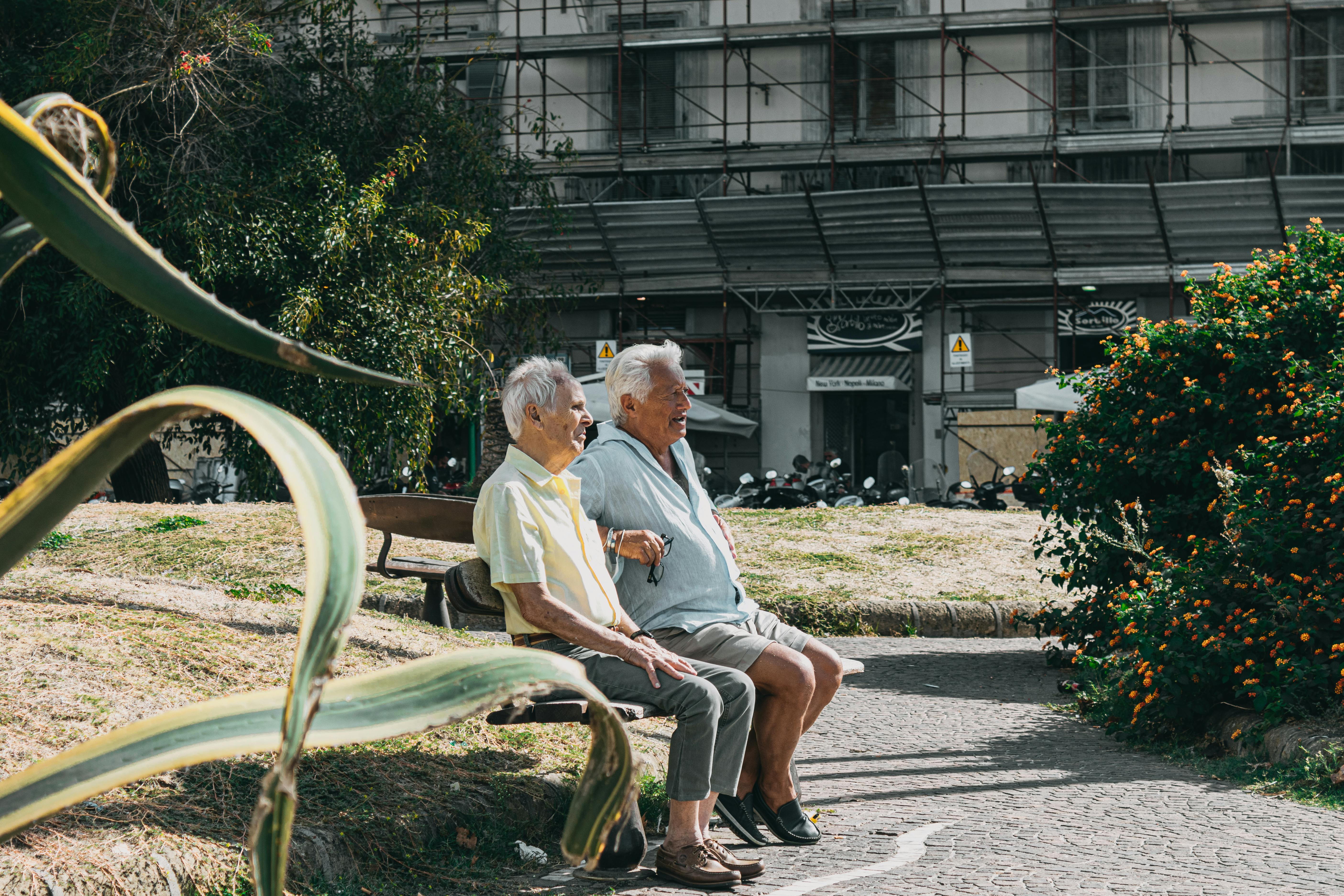 Elderly People Sitting on a Urban Bench · Free Stock Photo
