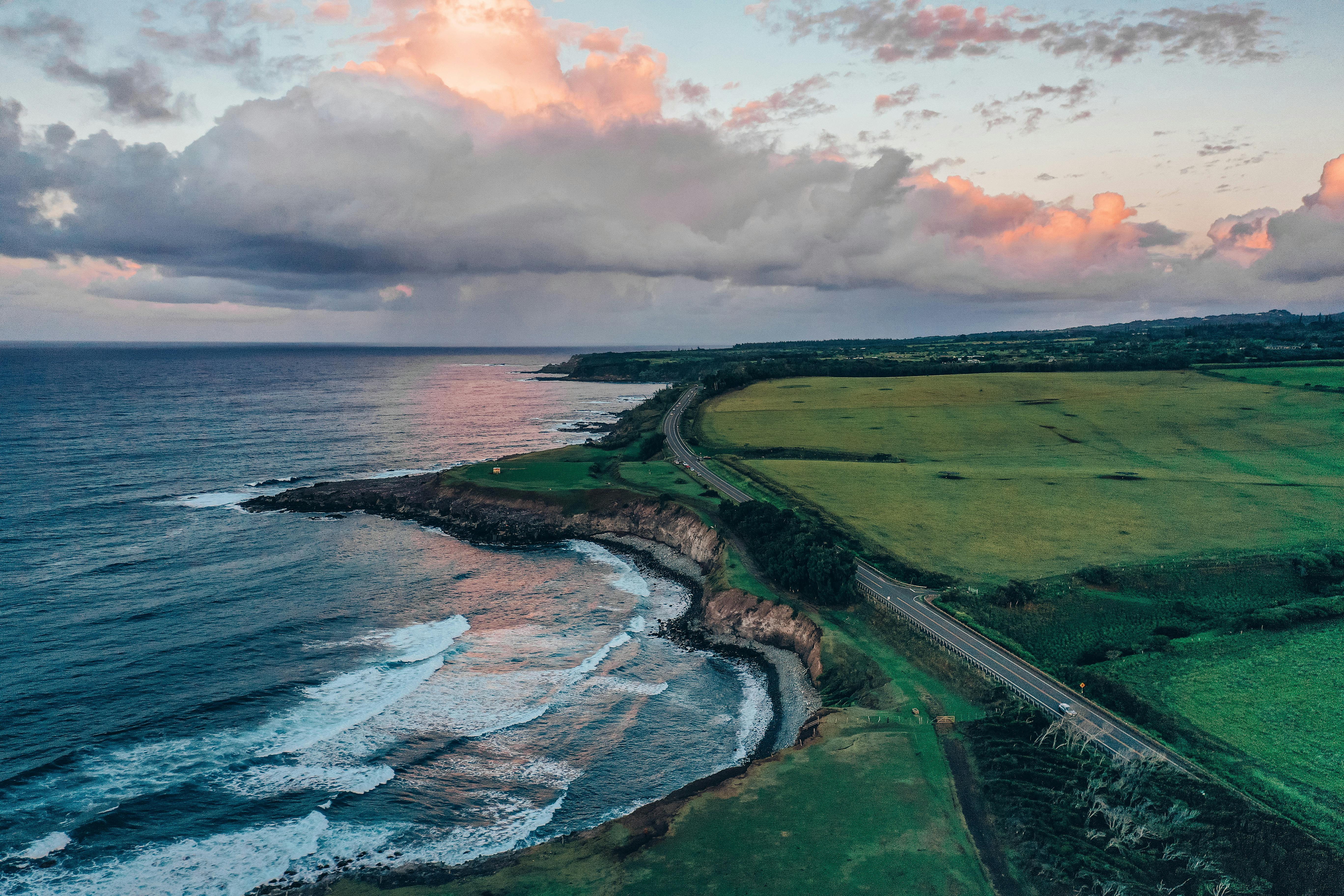 Green Grass Field Near the Sea · Free Stock Photo