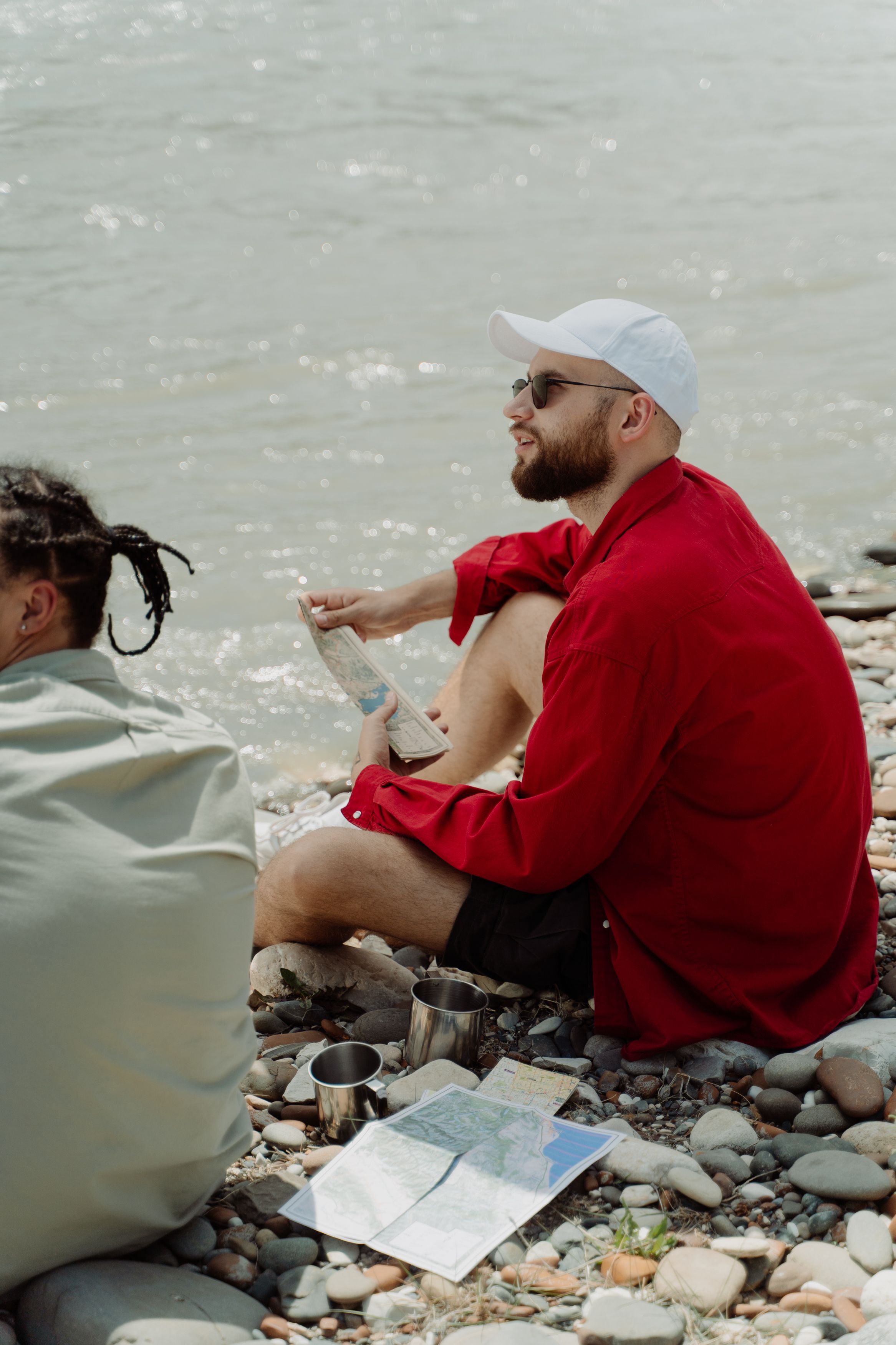 Men Sitting by the Riverside · Free Stock Photo