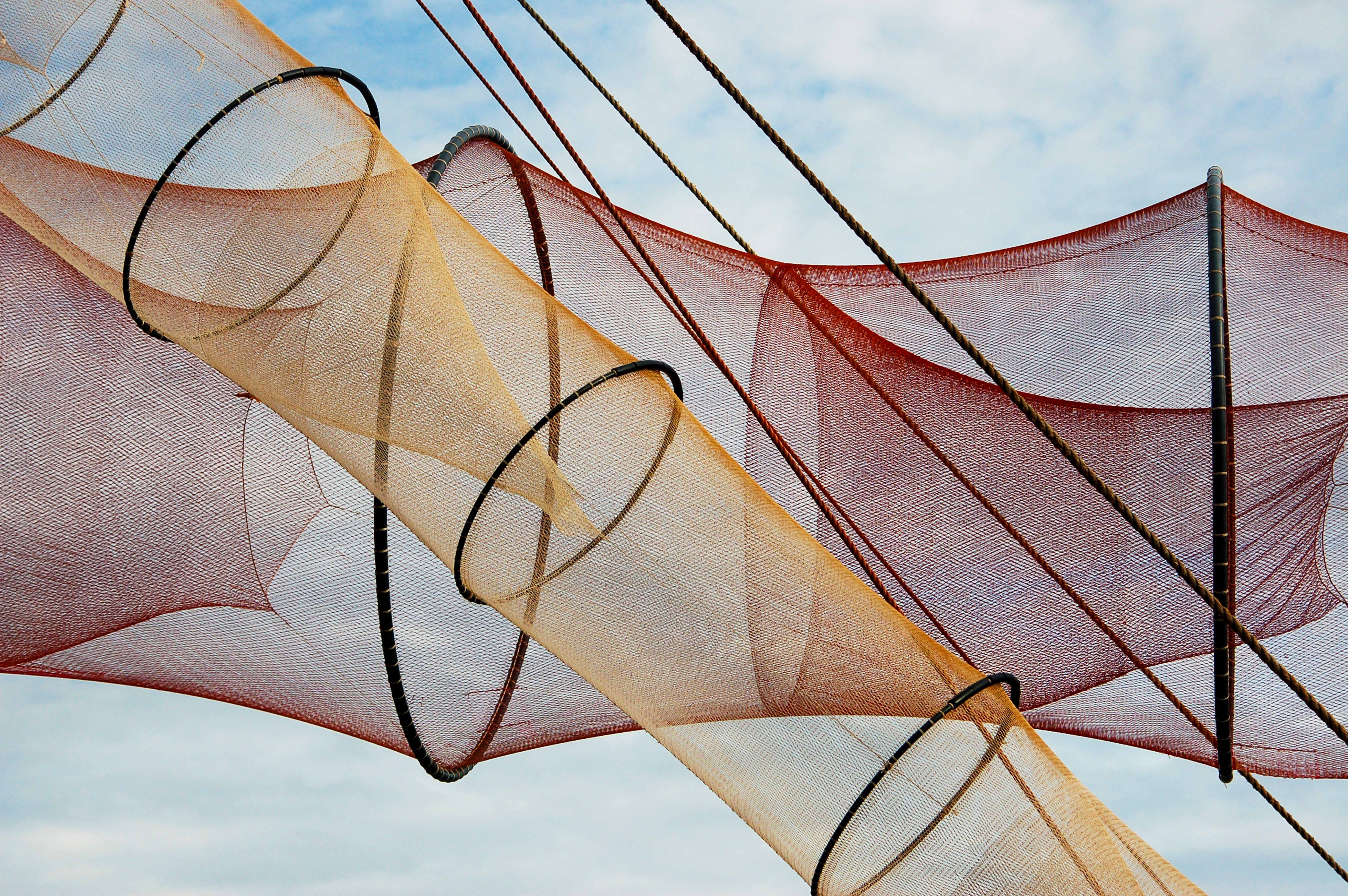 Fishing Nets Floating in the Air · Free Stock Photo