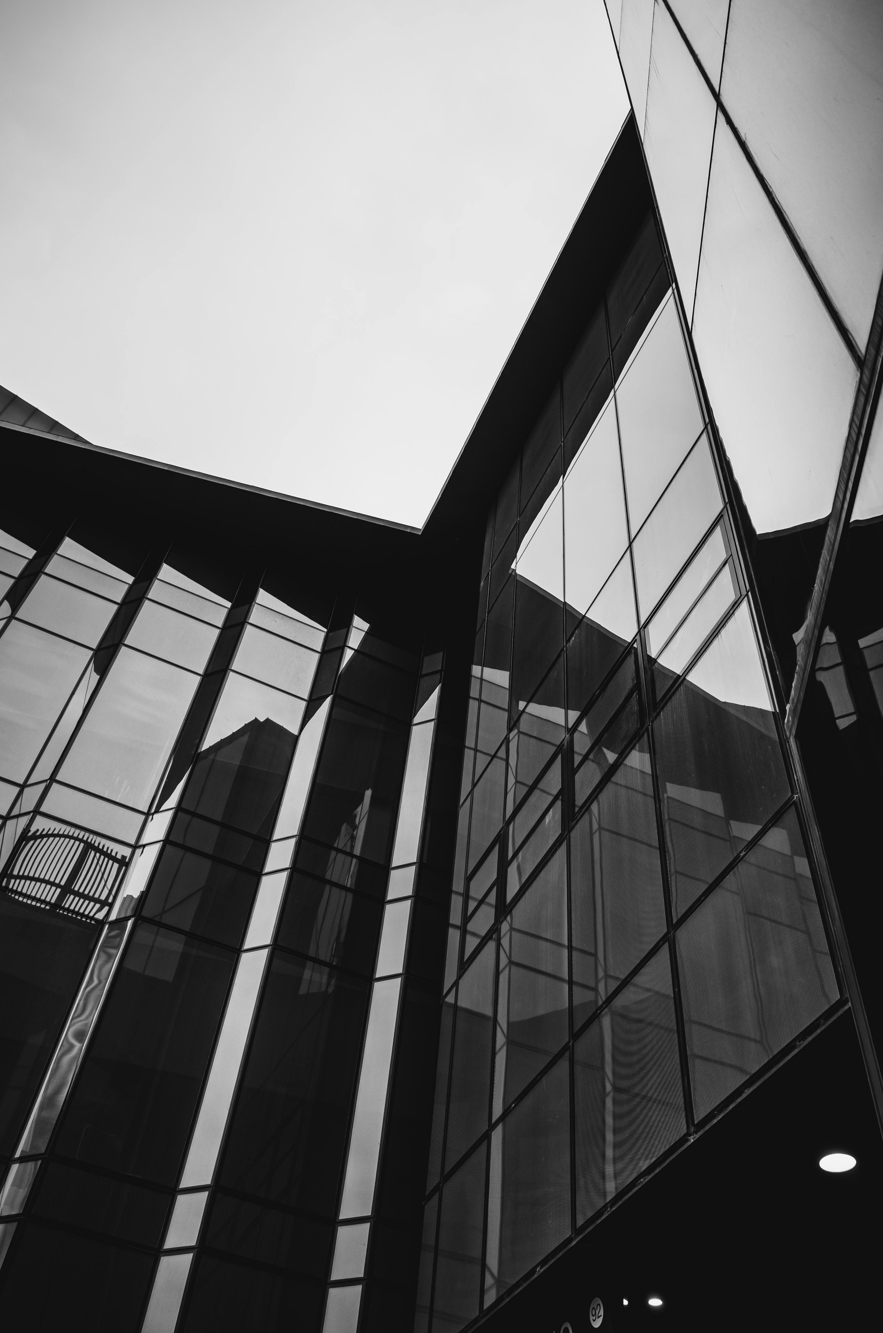 Black and White Photo of Glass Building · Free Stock Photo
