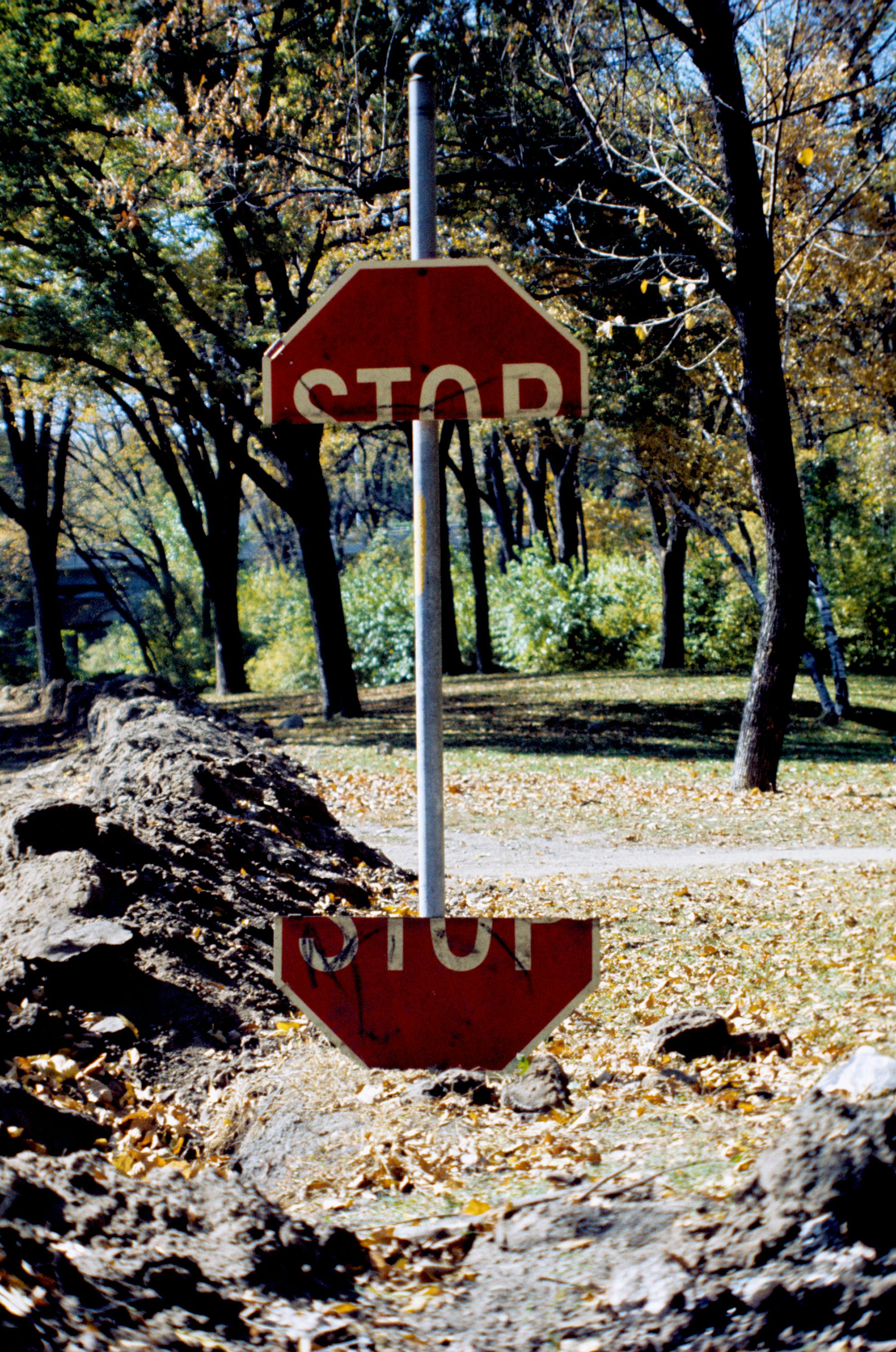 Vandalized Stop Road Sign · Free Stock Photo