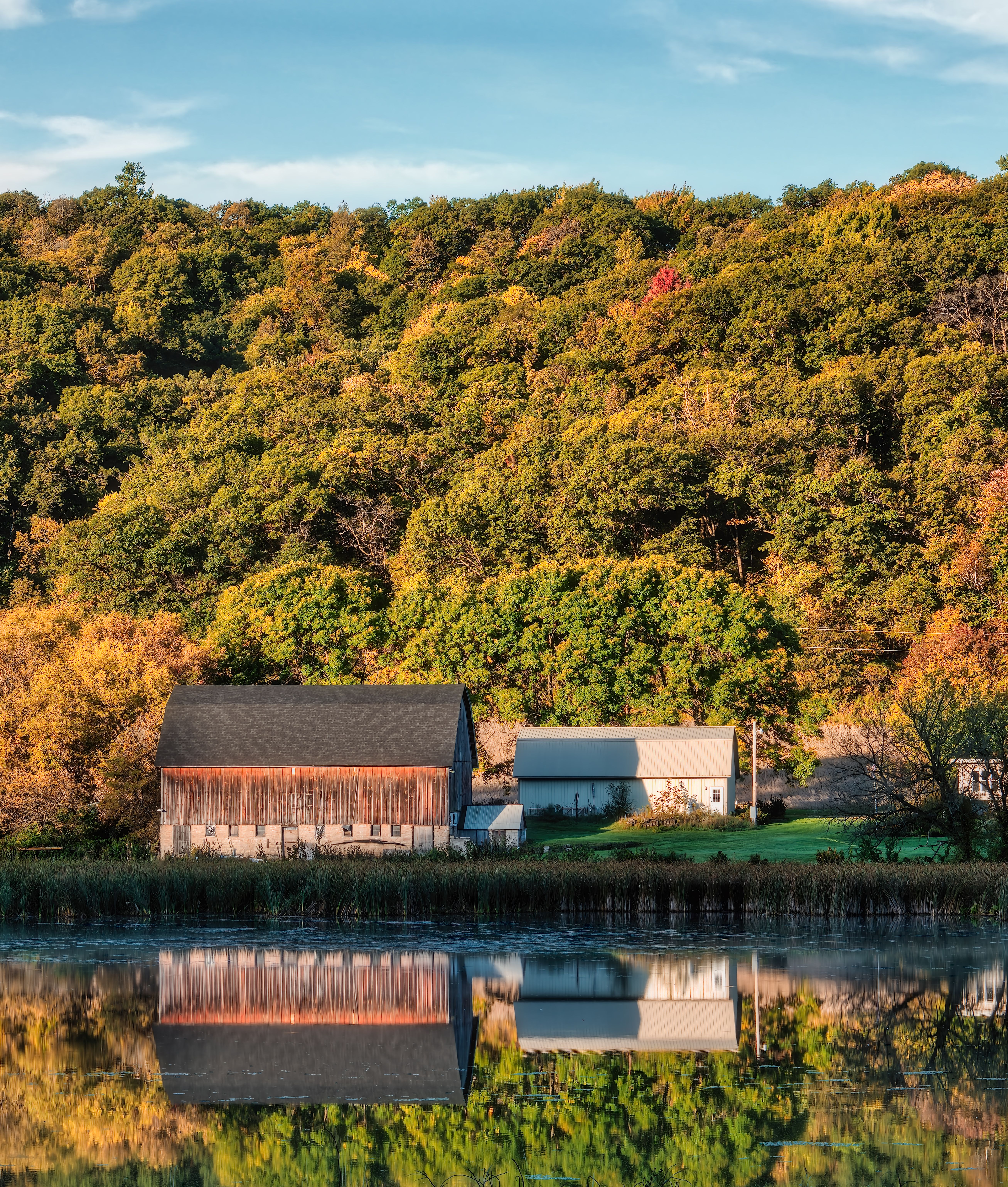 Barn and House by River · Free Stock Photo