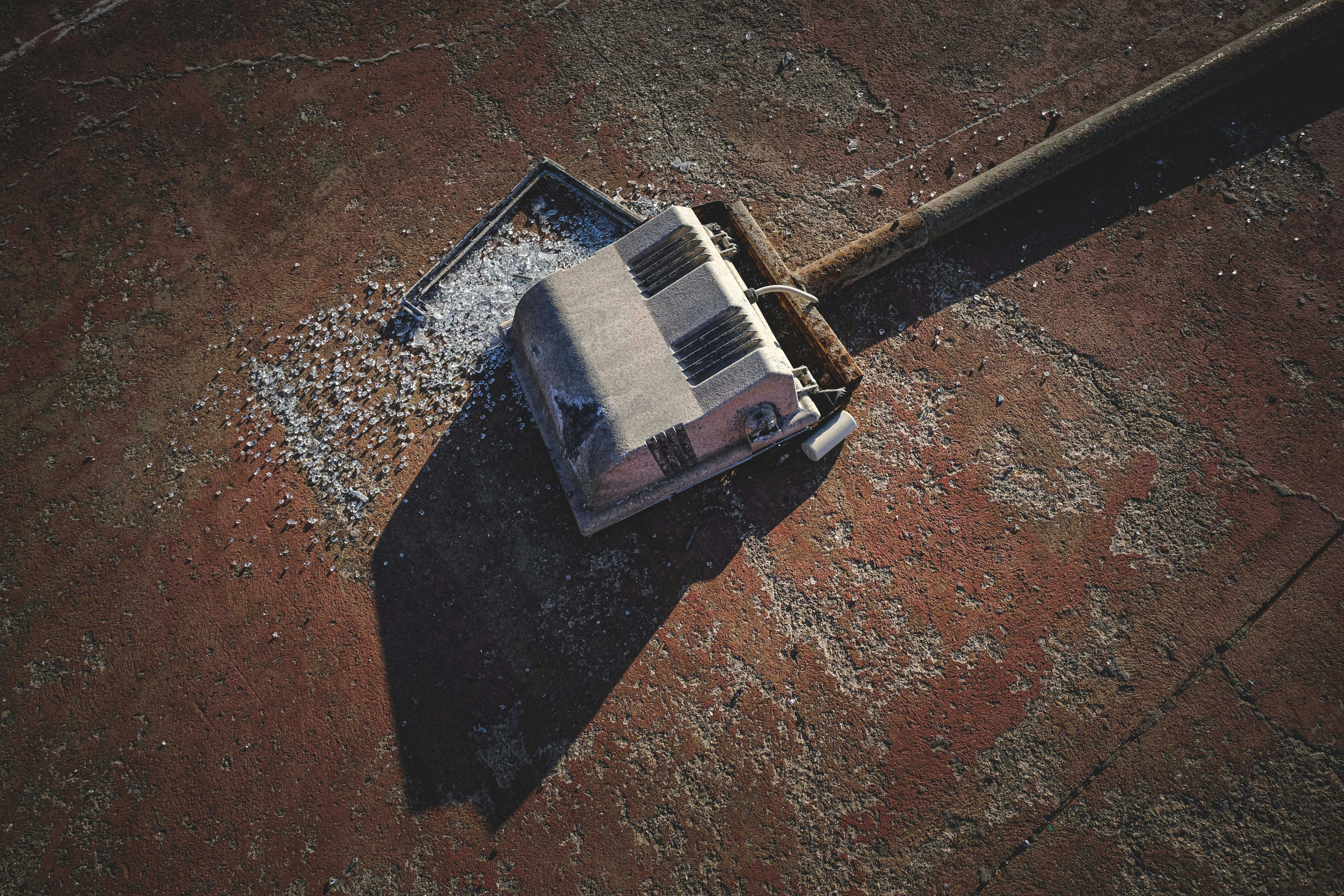 Fallen Fallen Light Post on the Ground · Free Stock Photo