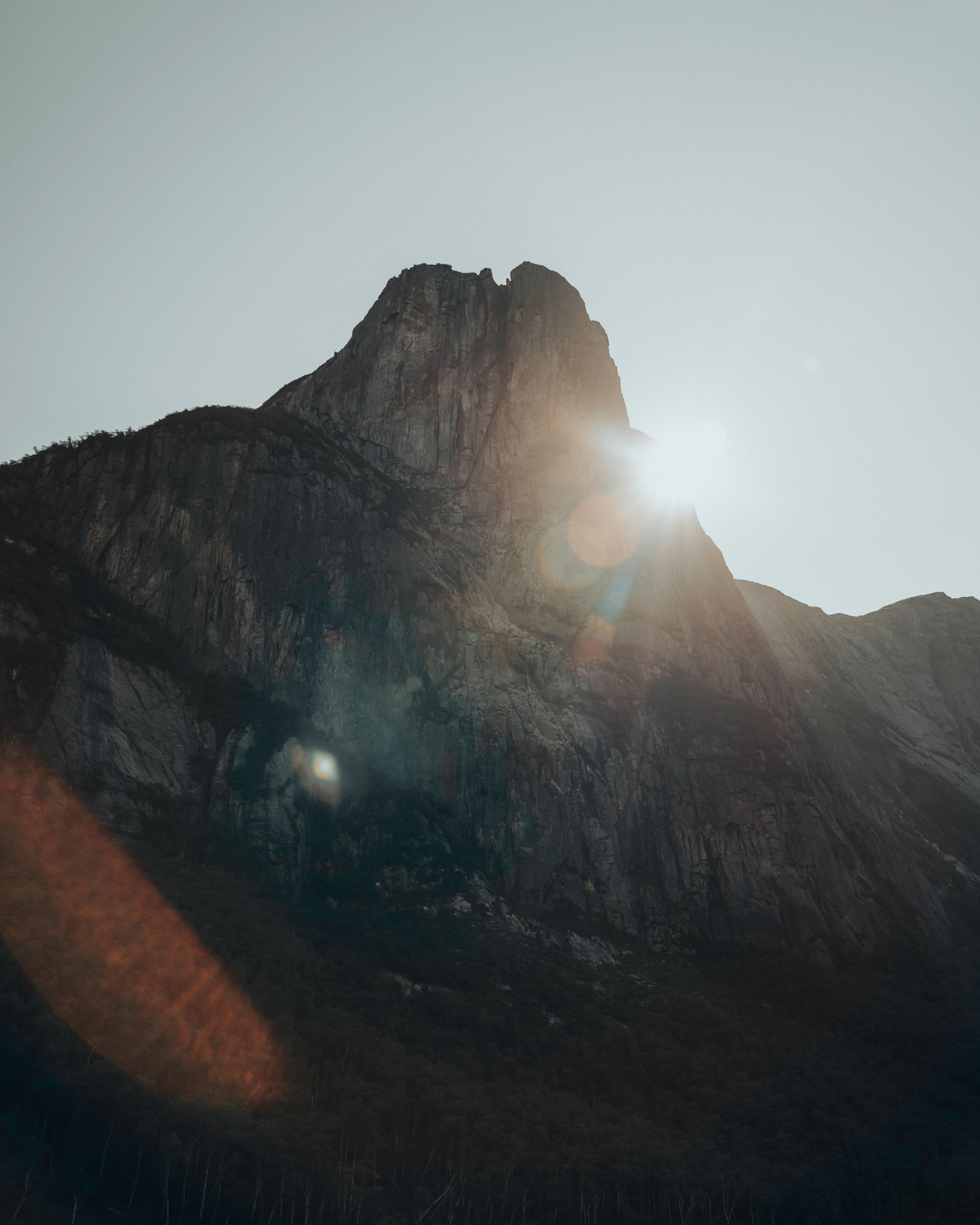 Back lit Mountain with Reflecting Sunbeams · Free Stock Photo