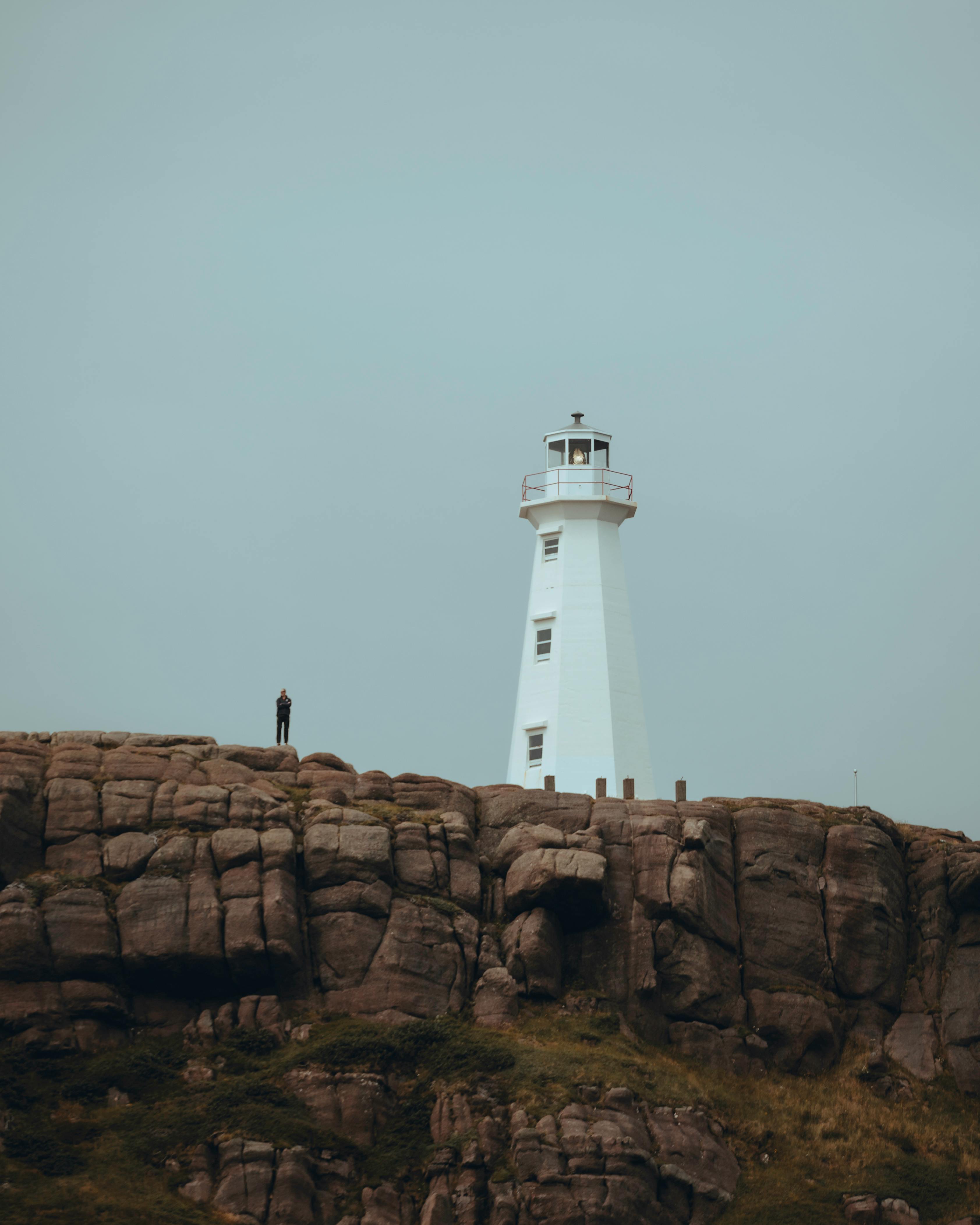 Lighthouse on Top of Limestone Rock Formation Overlooking Sea · Free ...