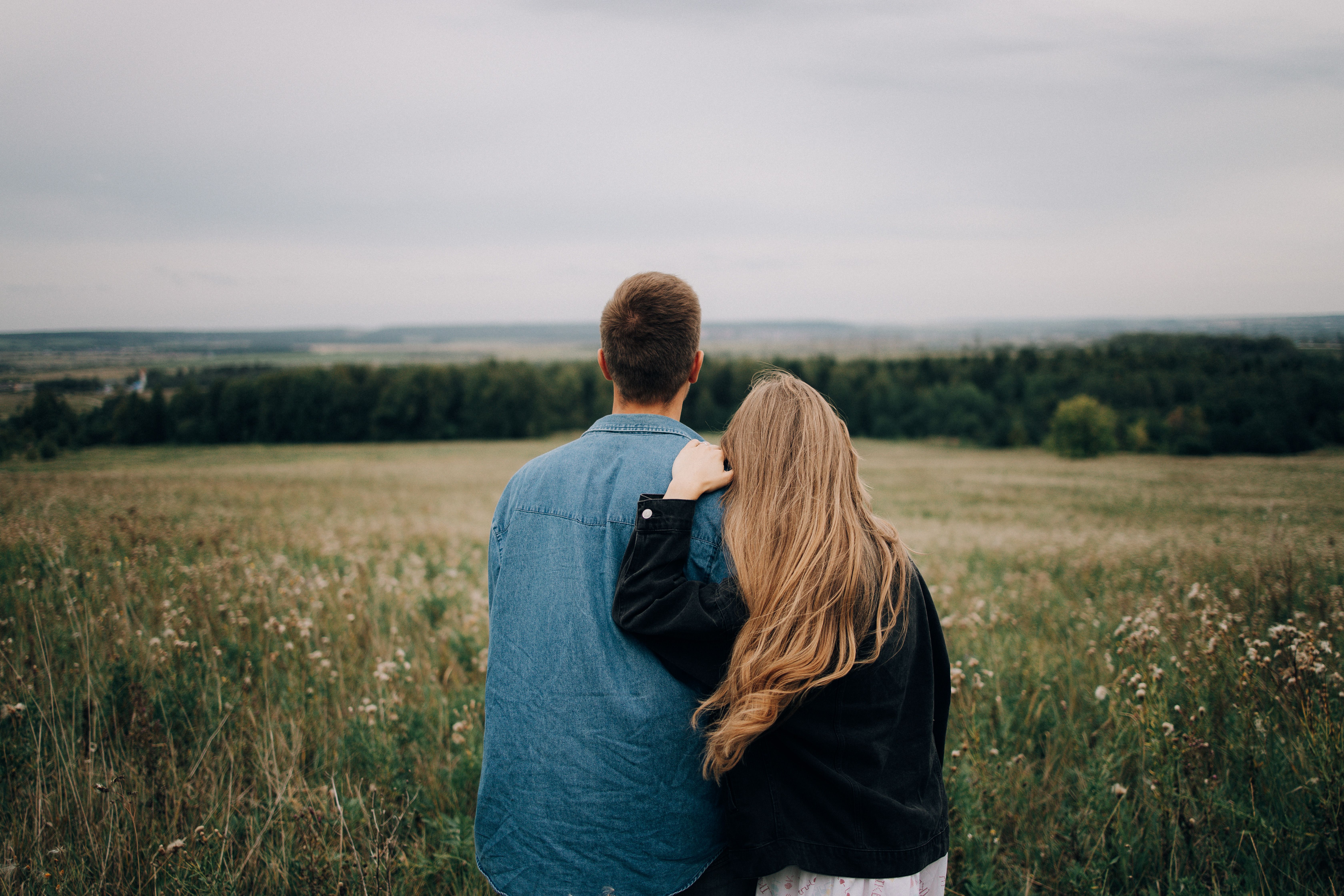 Couple Standing on Top of Hill · Free Stock Photo