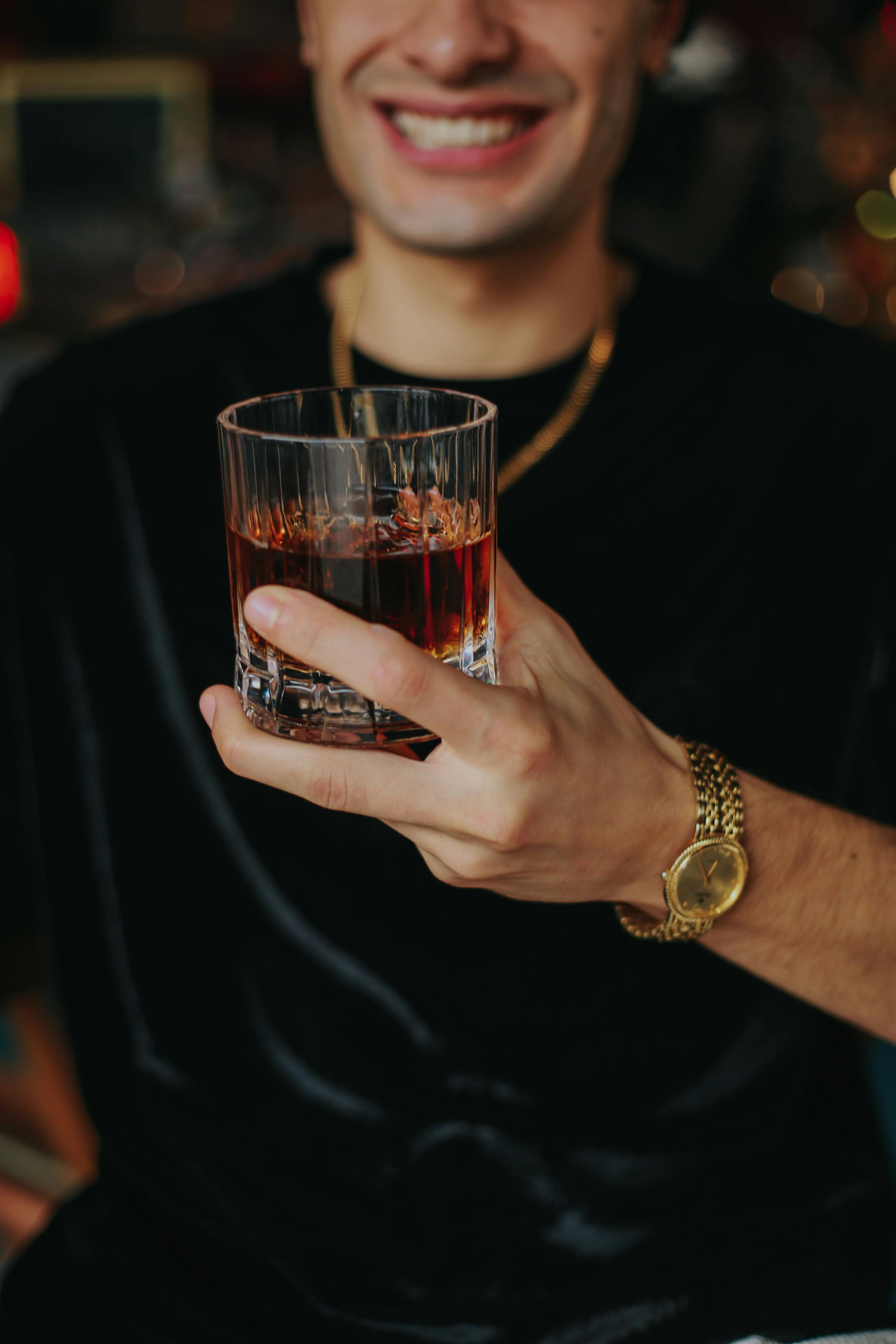 Close-up of Man Holding Drink · Free Stock Photo