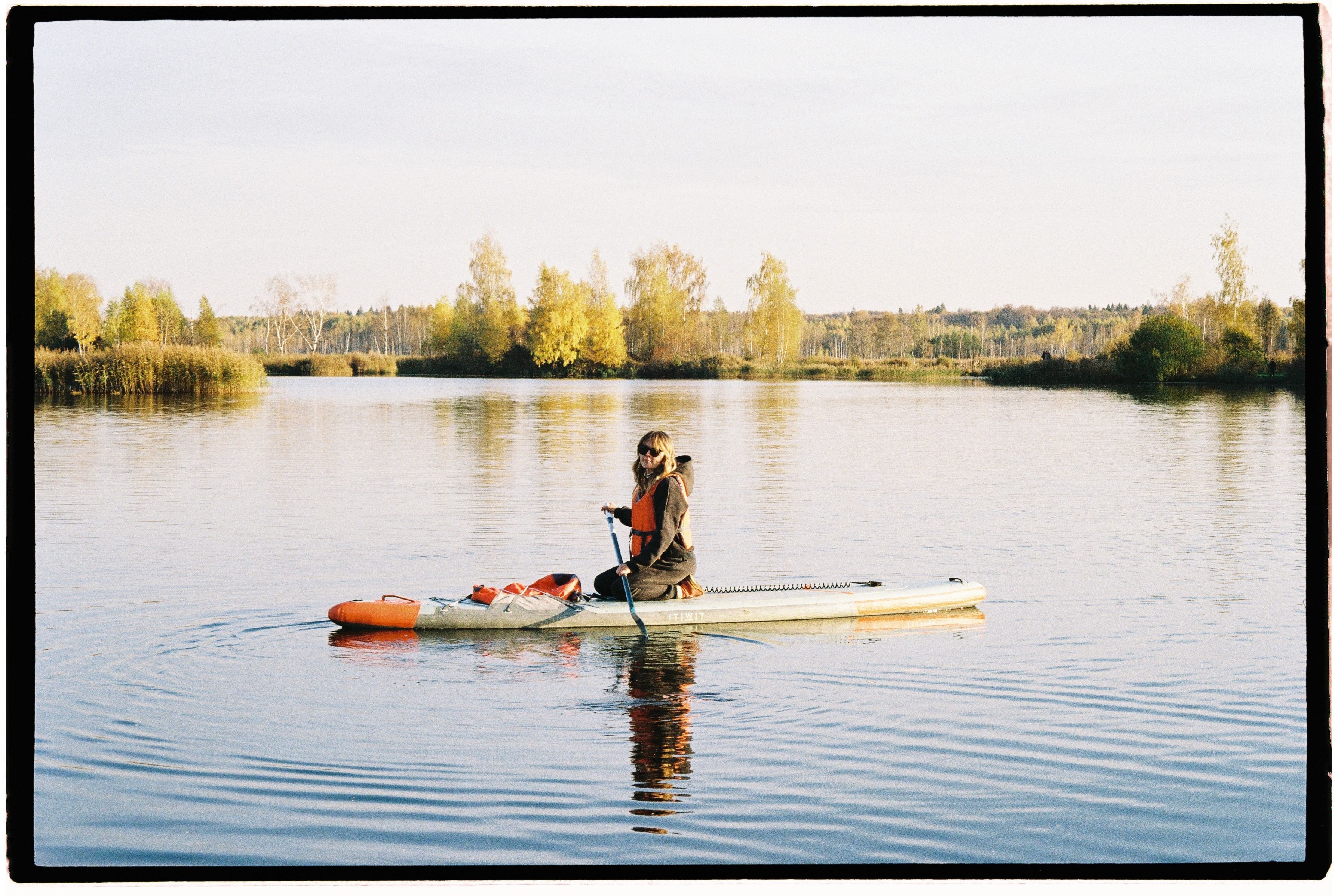 Person in Yellow Life Jacket Sitting on Green Kayak on River · Free ...