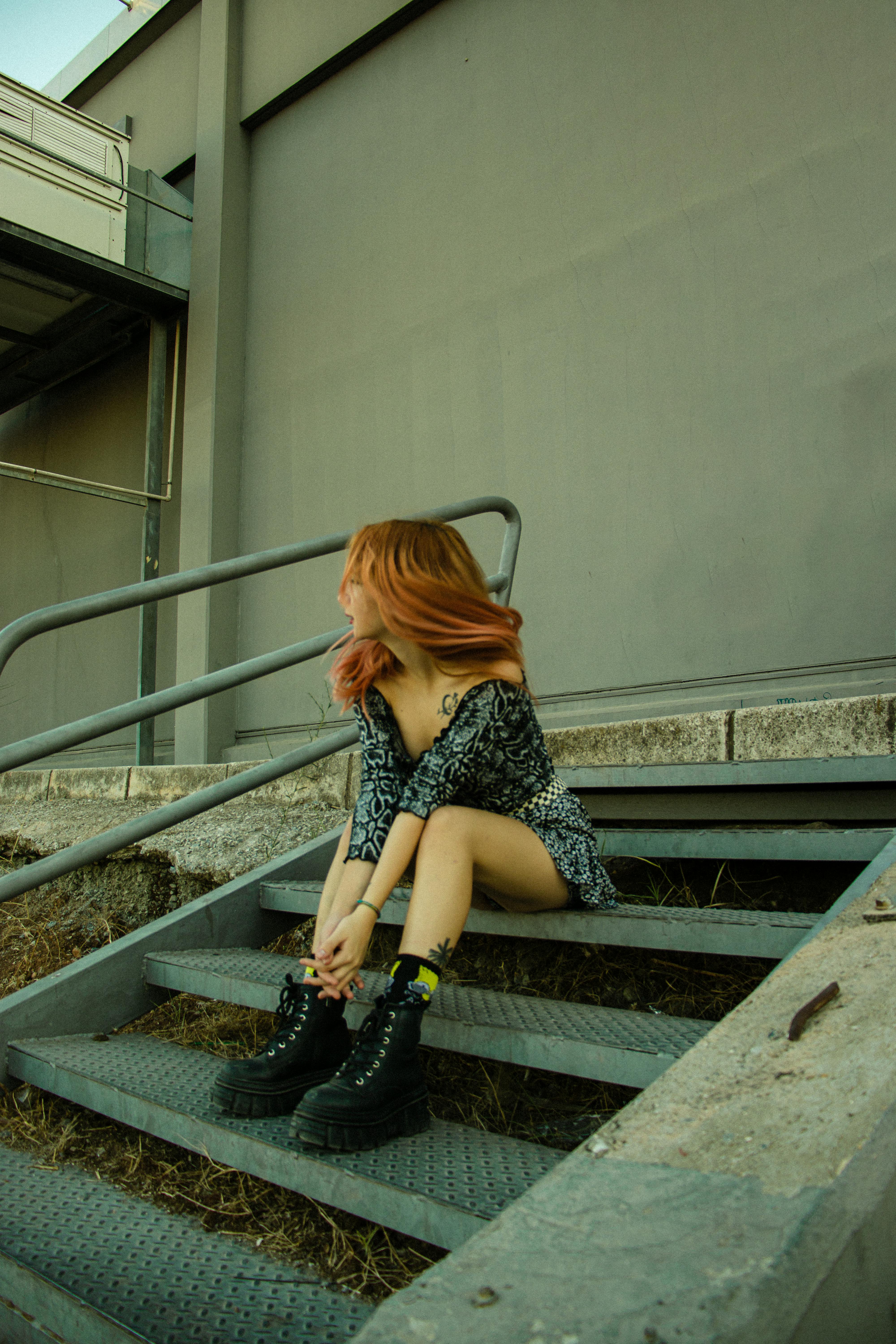 Woman Sitting on Stairs · Free Stock Photo