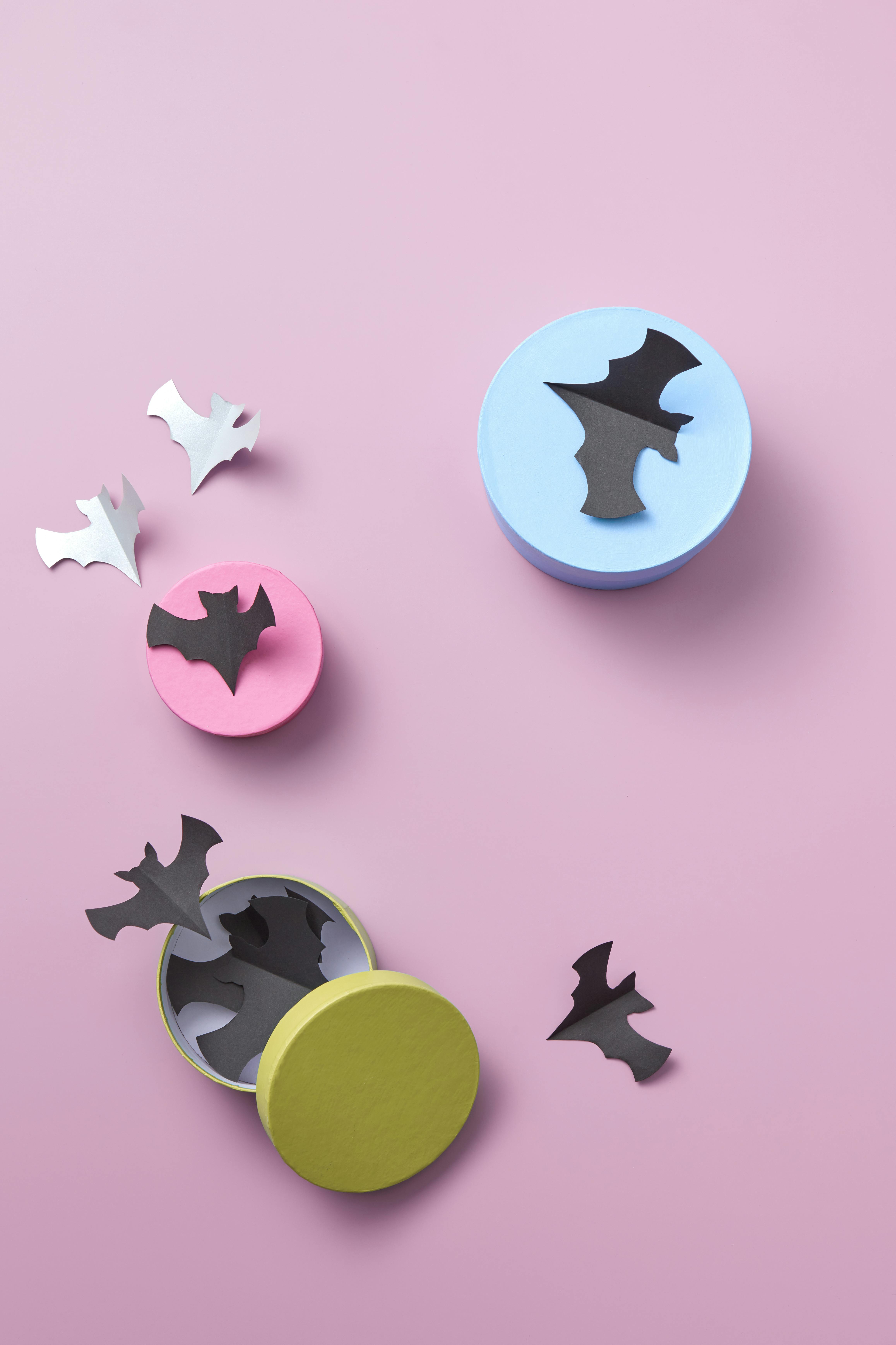 Bat Shaped Paper on Pink Surface · Free Stock Photo