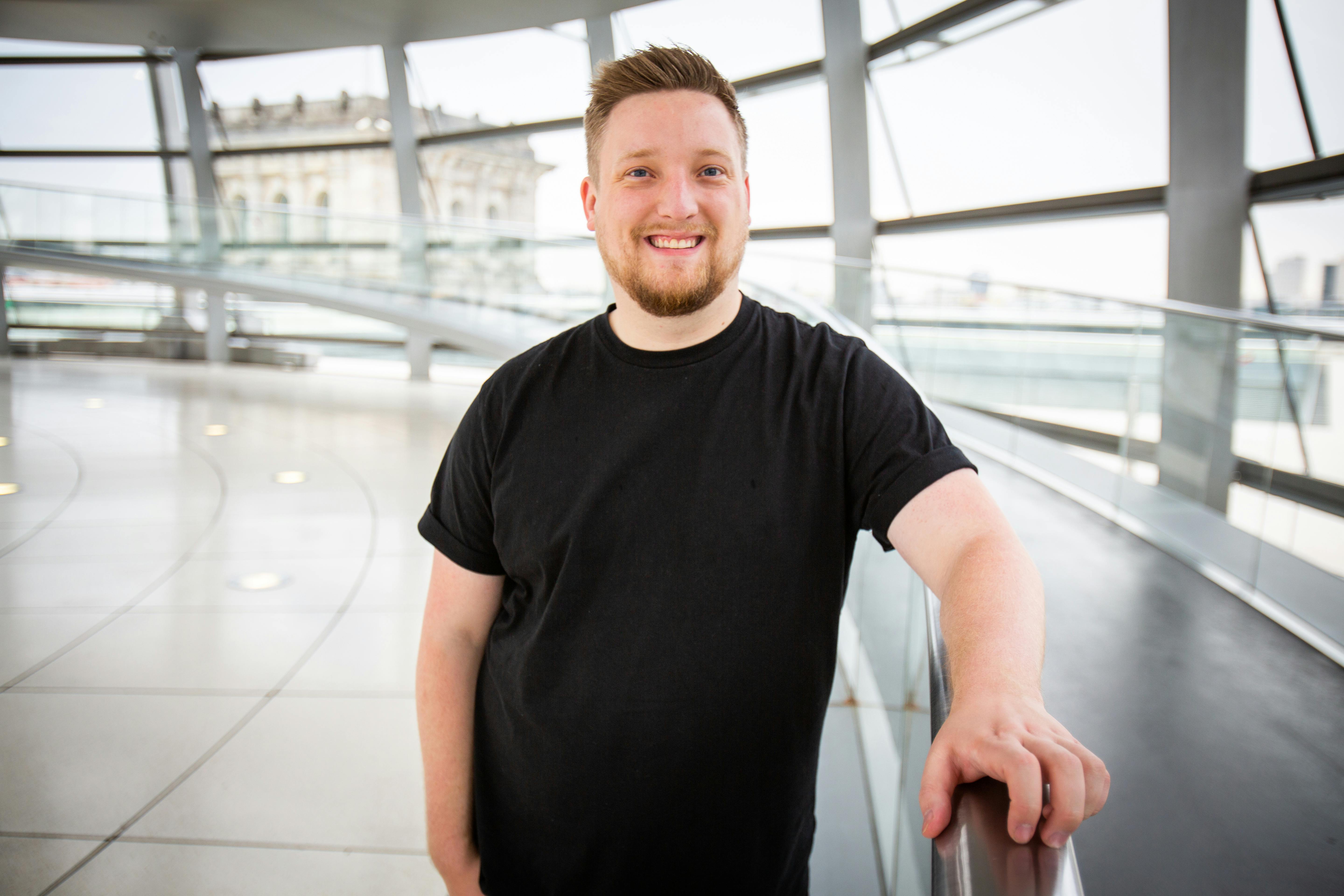 A Male Looking at Camera inside Office Interior · Free Stock Photo