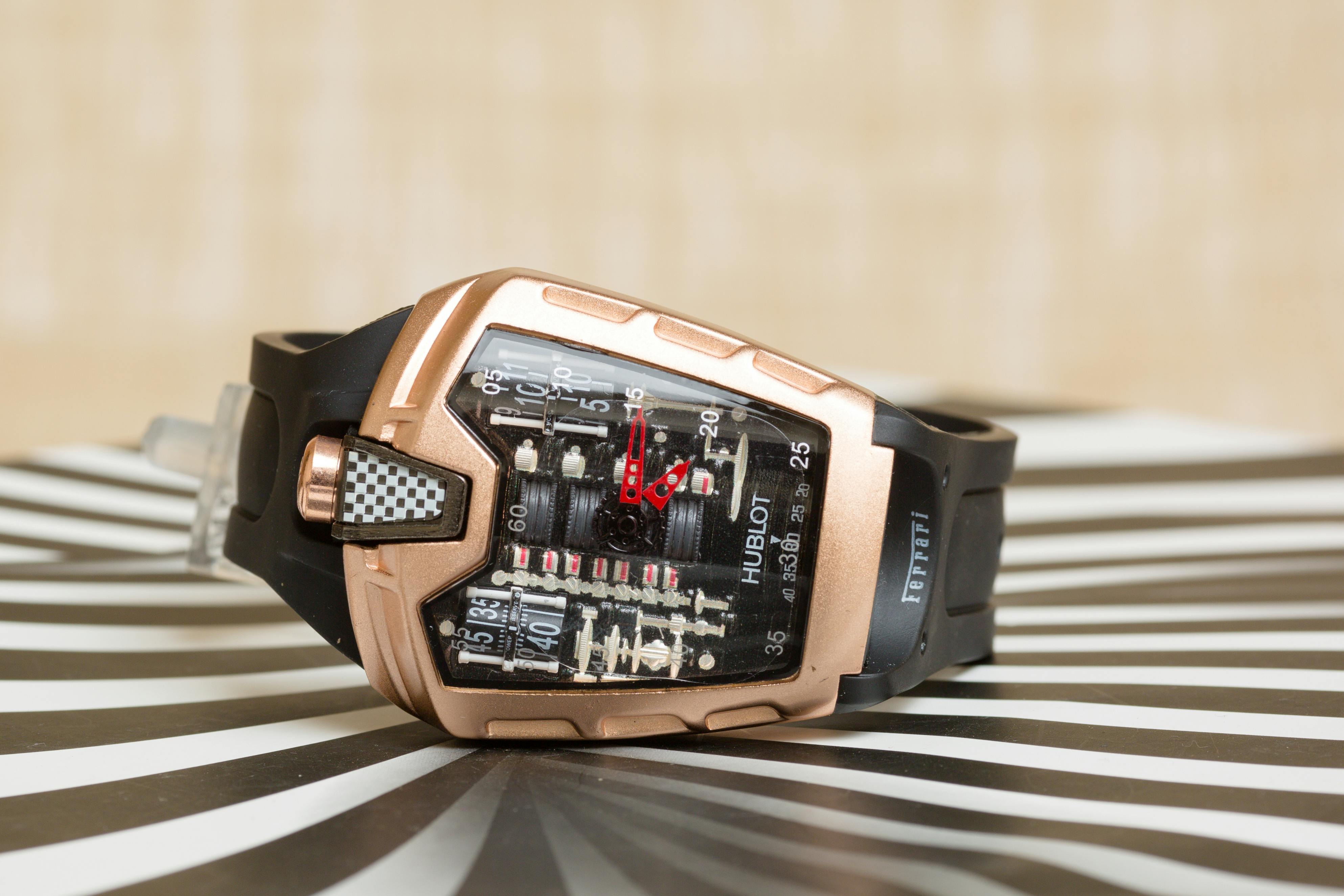 Modern Wristwatch on Brown Fabric · Free Stock Photo