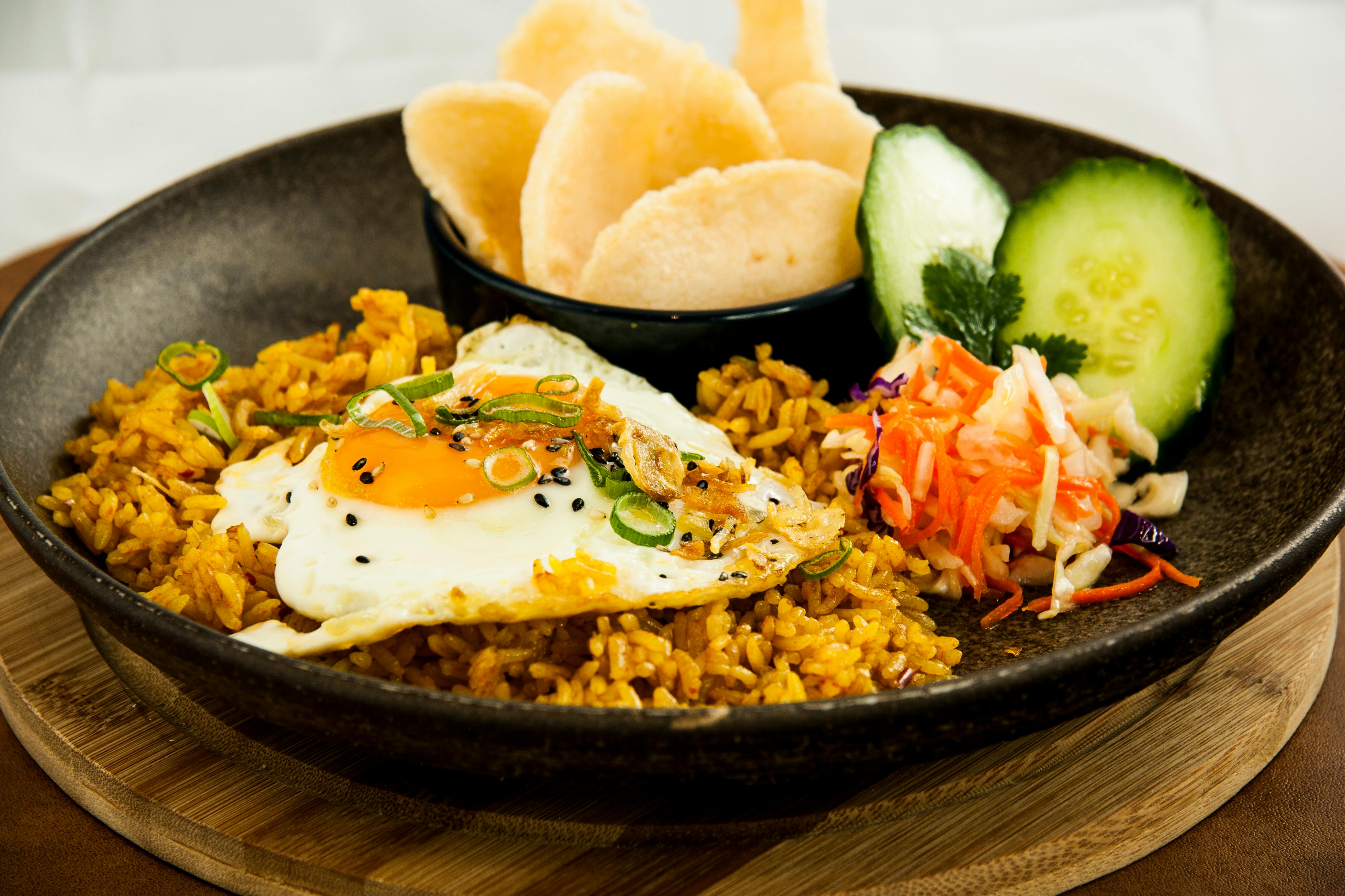 Fried Rice Topped with a Sunny Side up Egg · Free Stock Photo