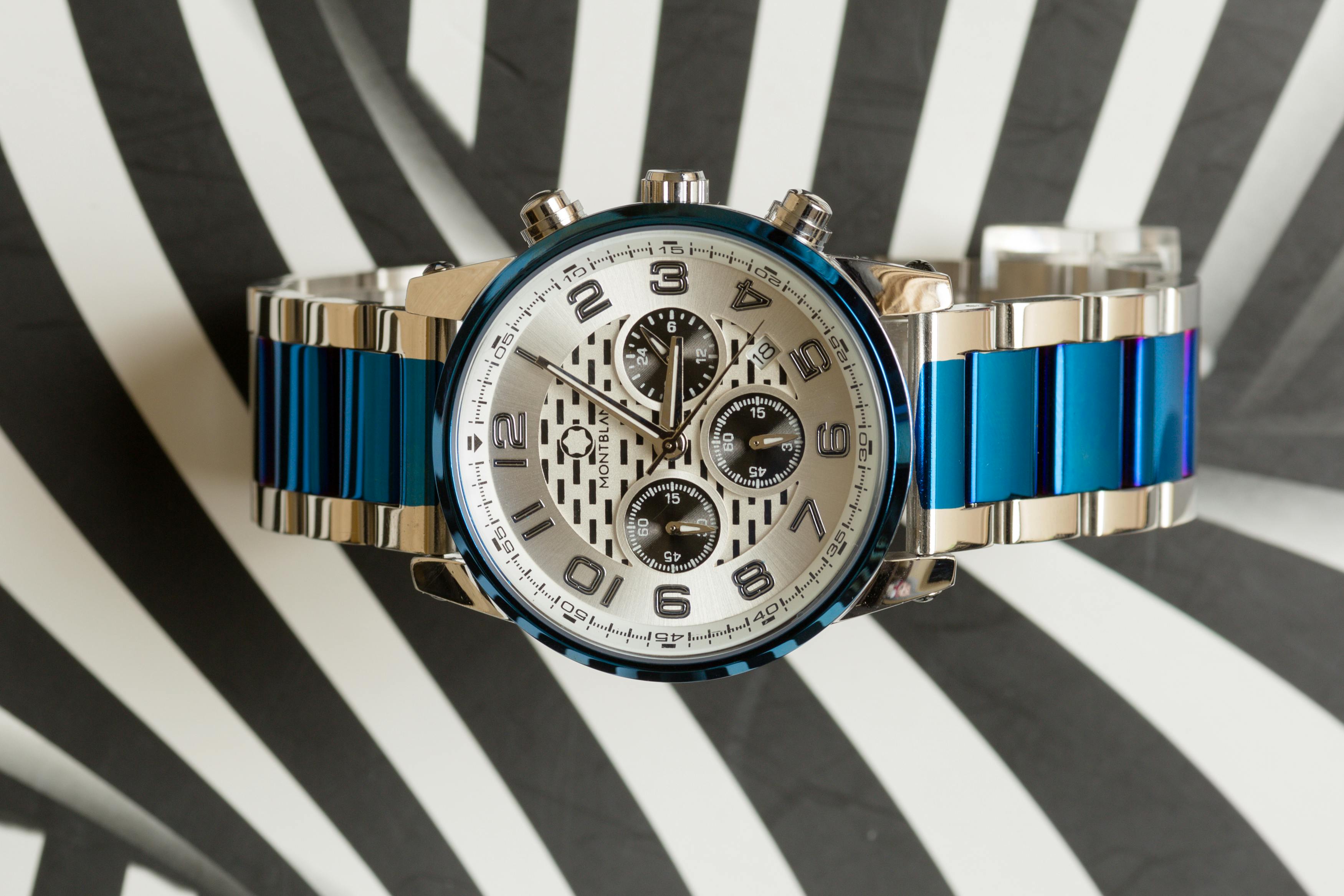 Grayscale Photo of a Silver Wristwatch · Free Stock Photo