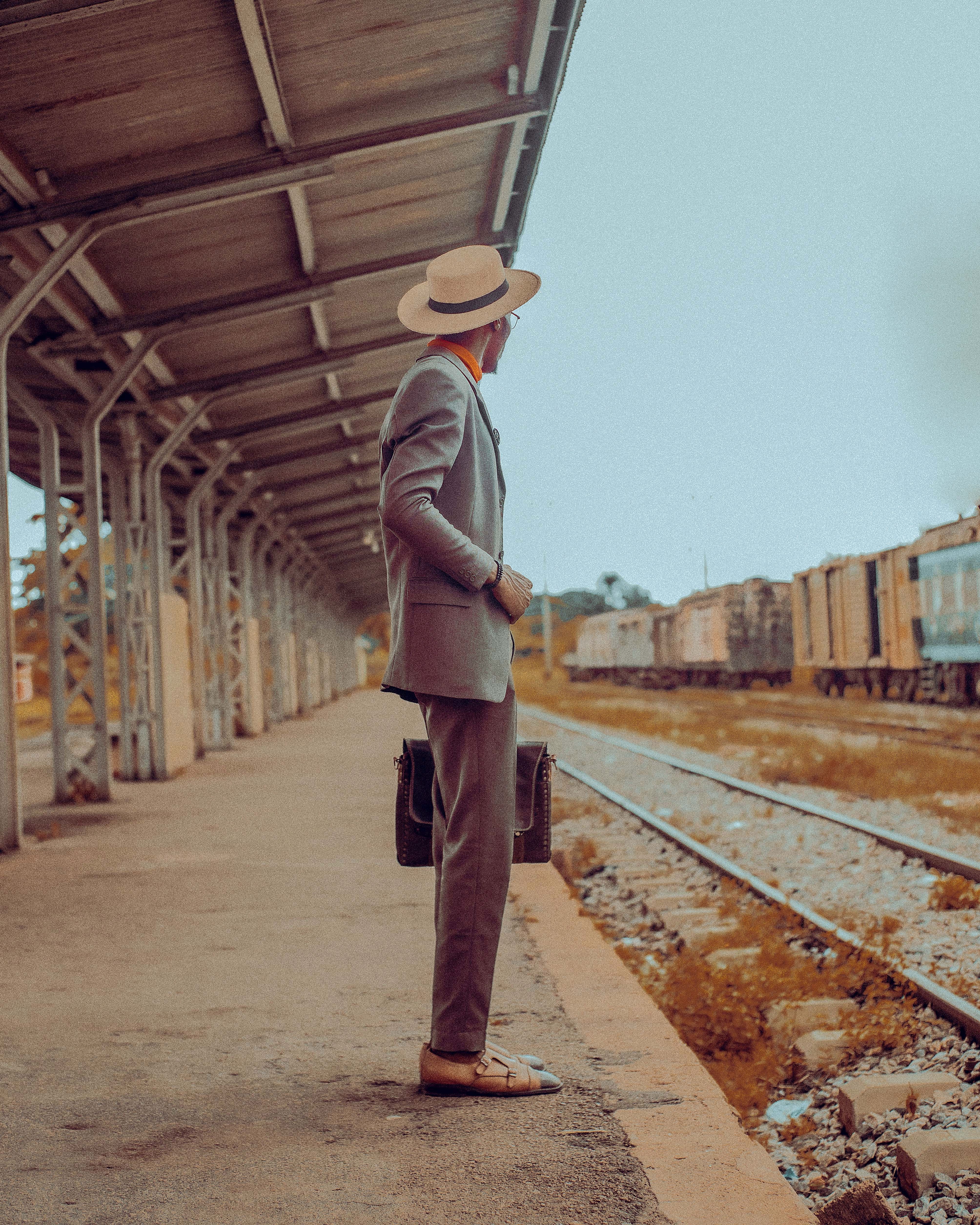 Portrait of Man Standing on Train Station · Free Stock Photo