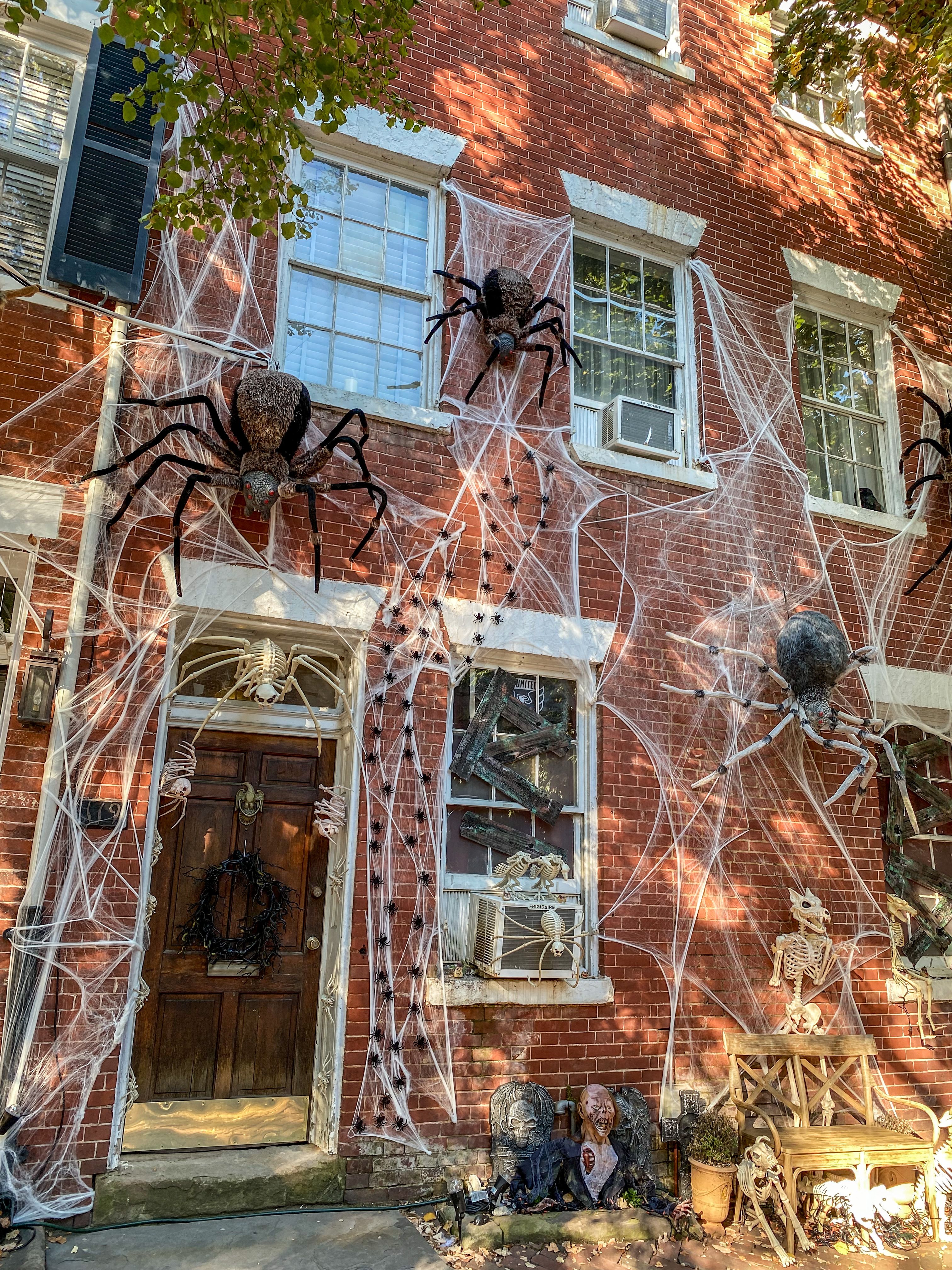 Halloween Decorations outside a Brick Building · Free Stock Photo
