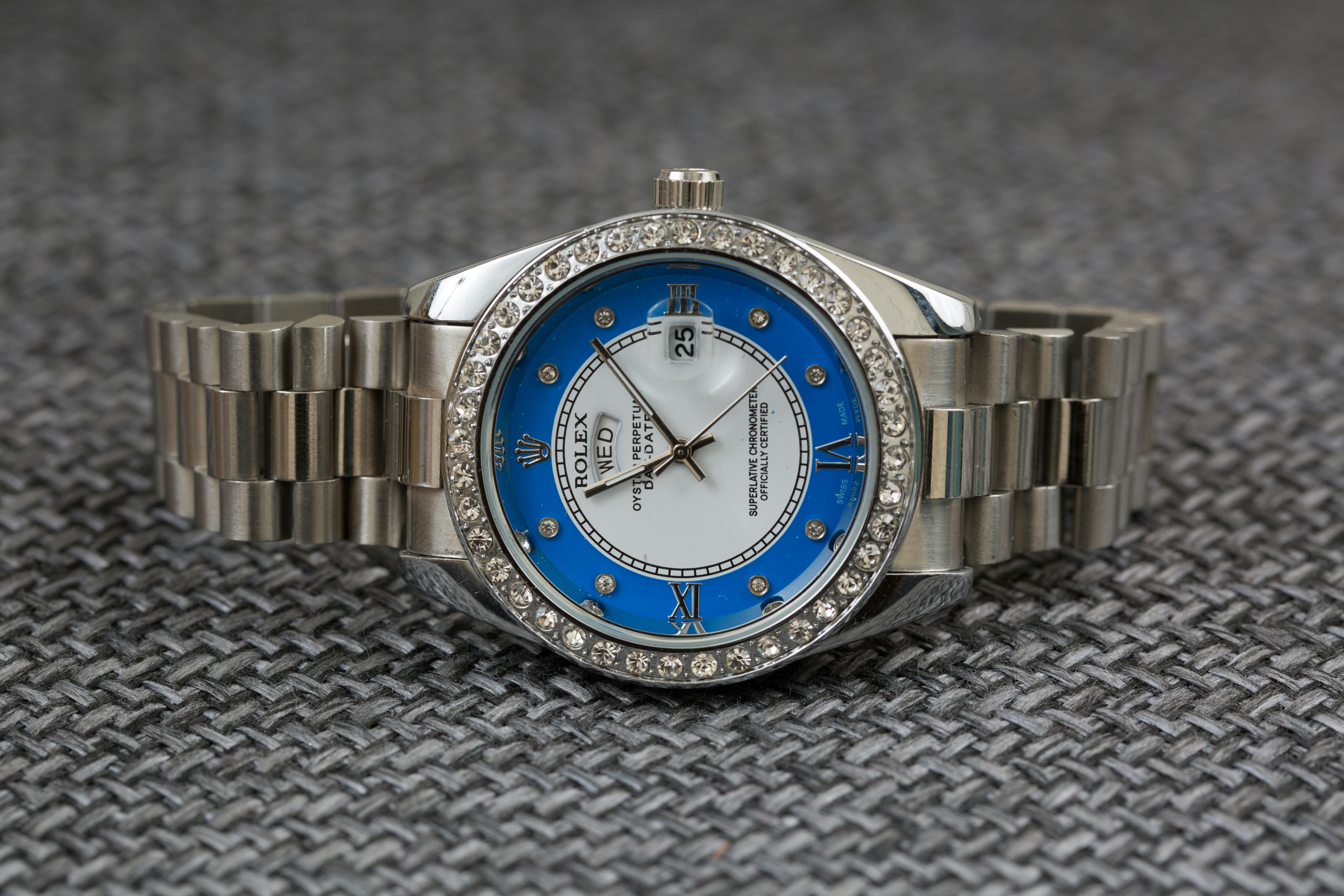 Grayscale Photo of a Silver Wristwatch · Free Stock Photo