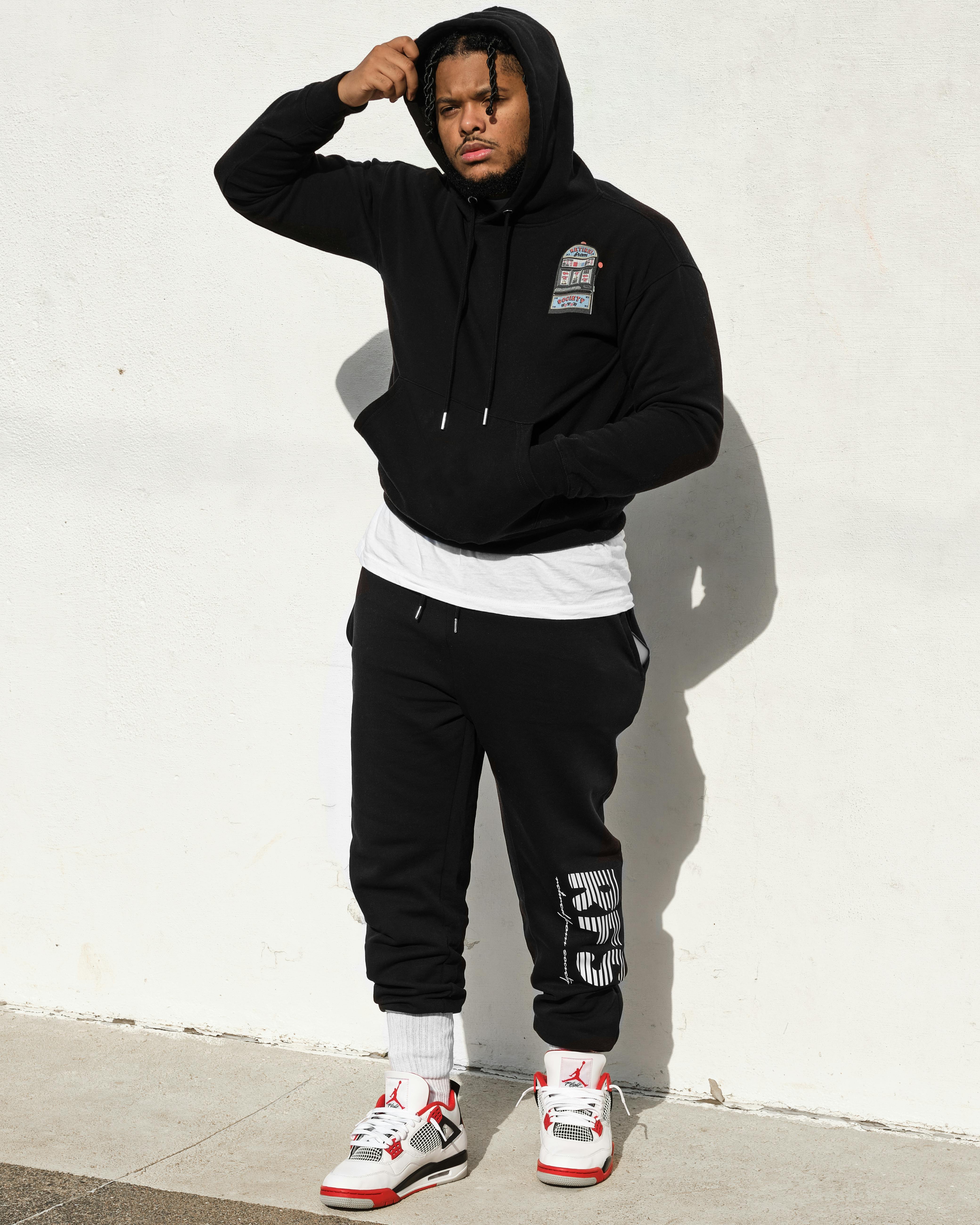 A Stylish Man Wearing His Hoodie · Free Stock Photo