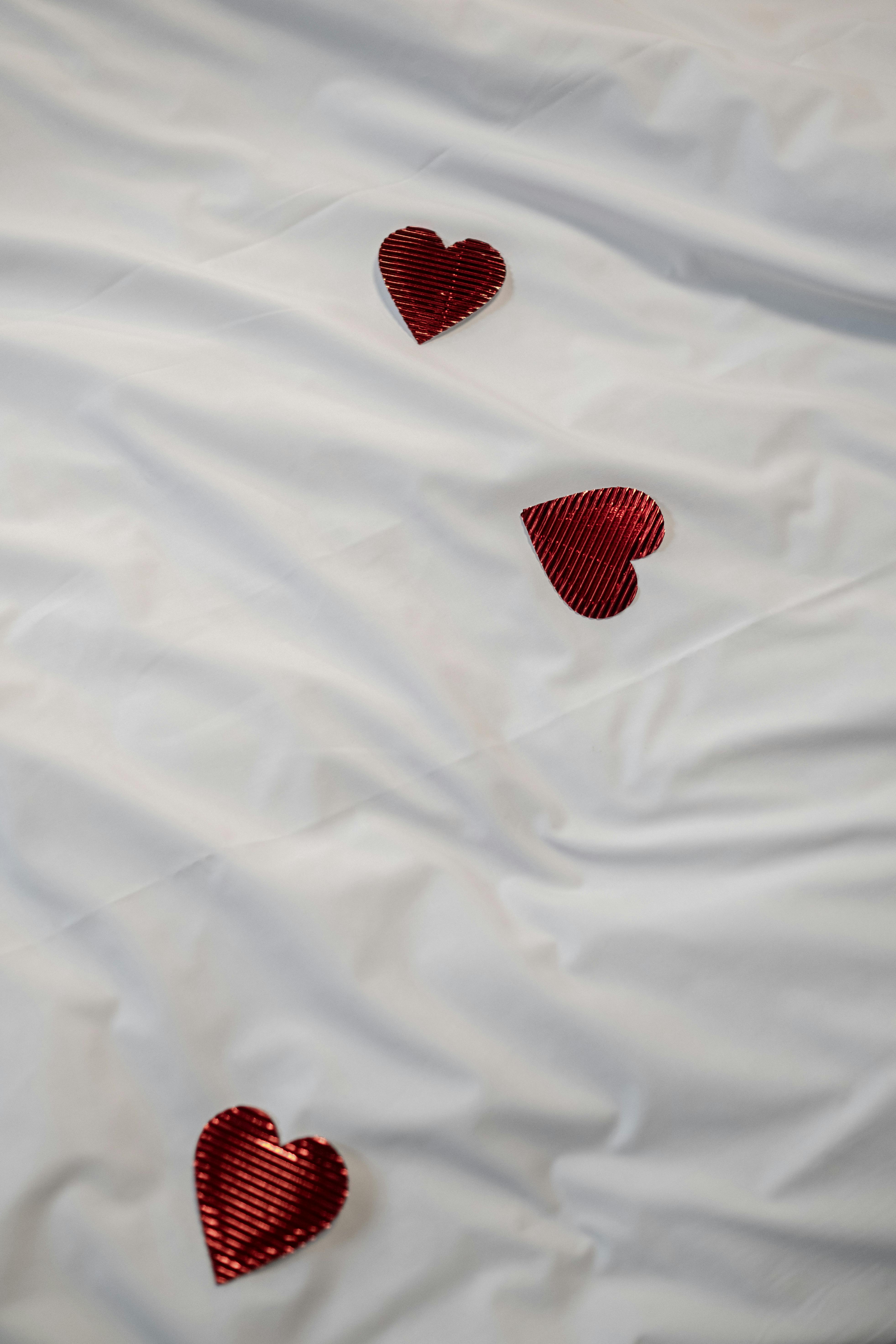 Hearts on White Cloth · Free Stock Photo