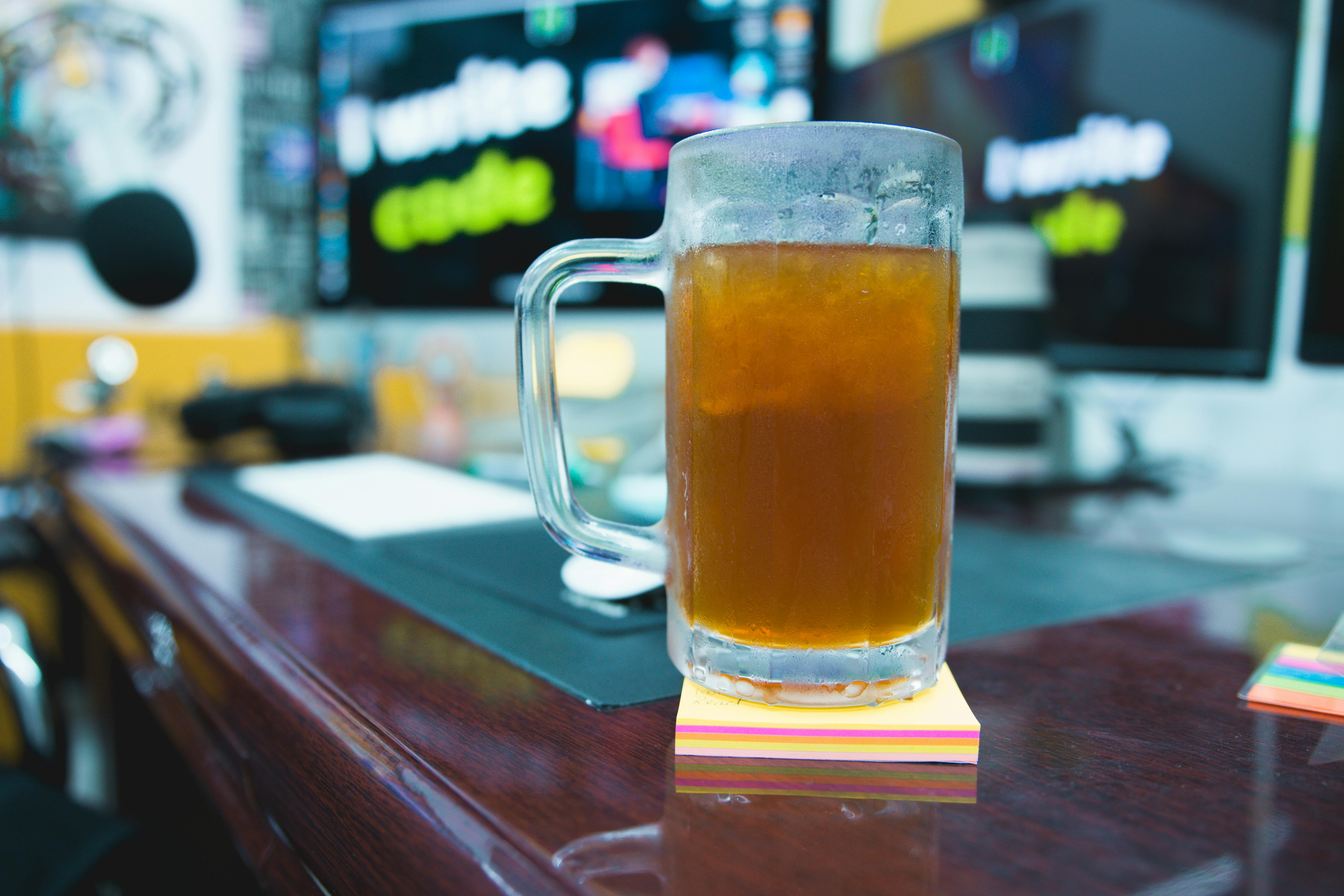 Selective Focus Photography of Man Facing Computer · Free Stock Photo