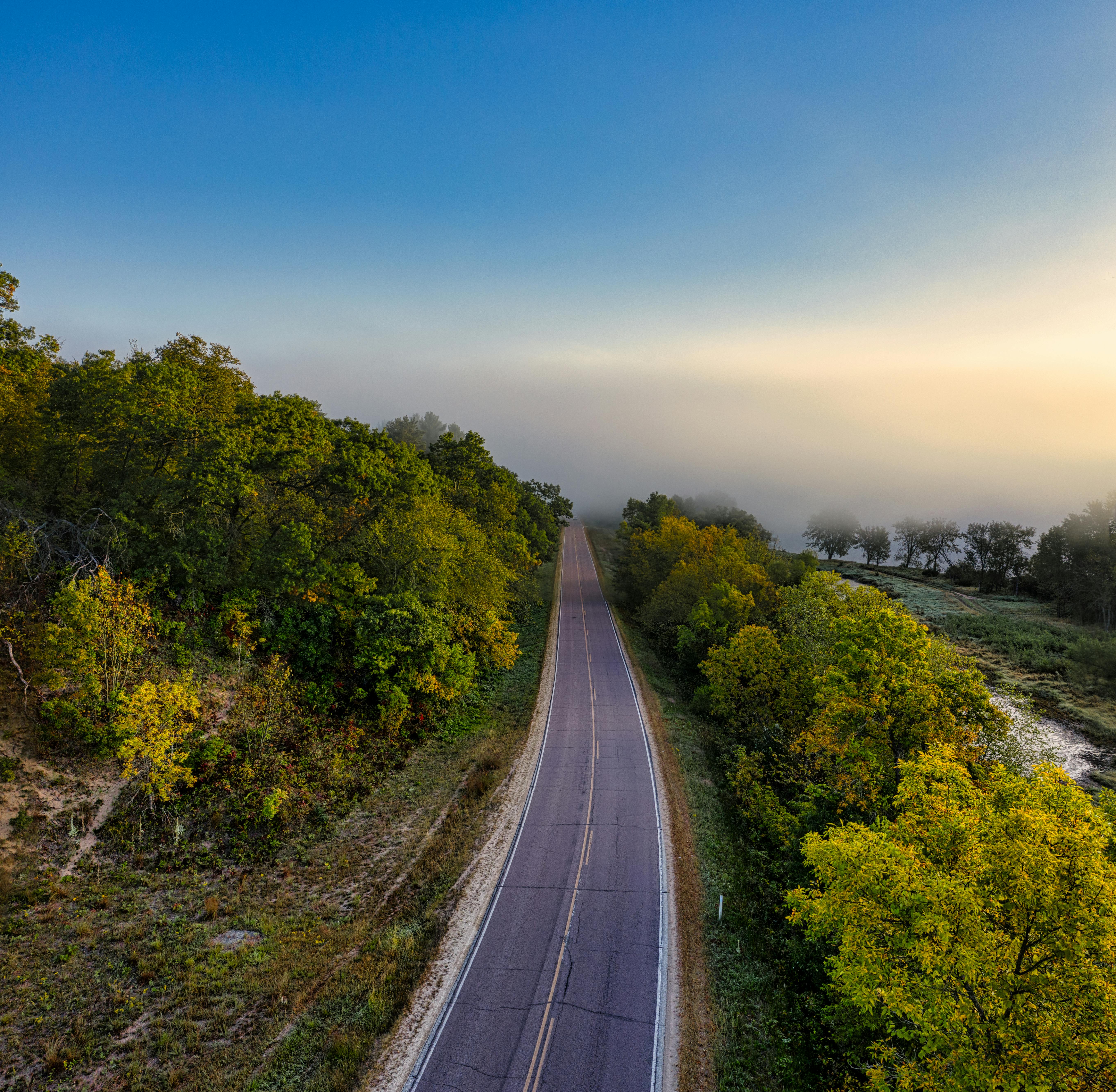 Asphalt Road With Yellow Lane · Free Stock Photo