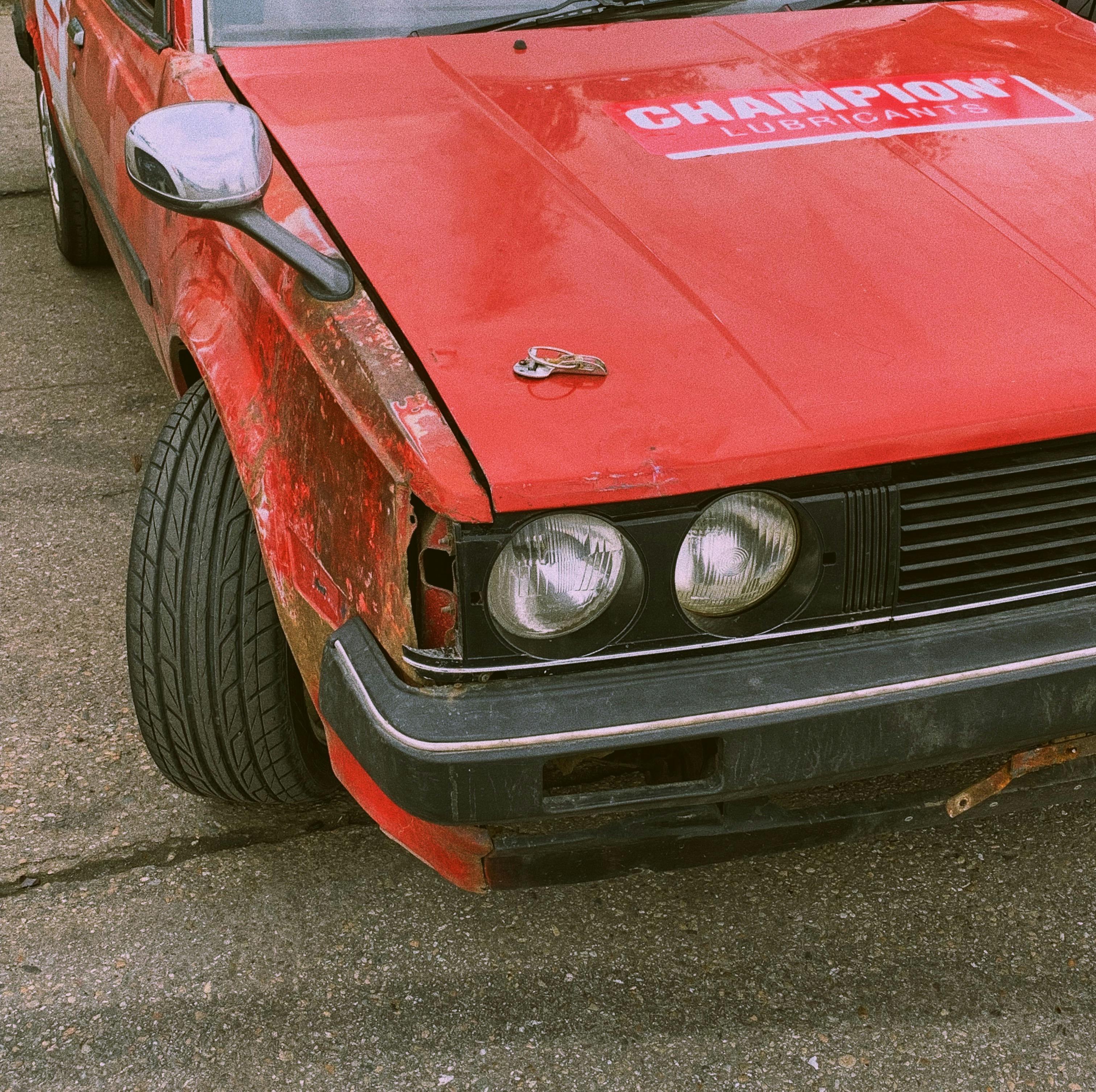 Red Car Parked on Road · Free Stock Photo