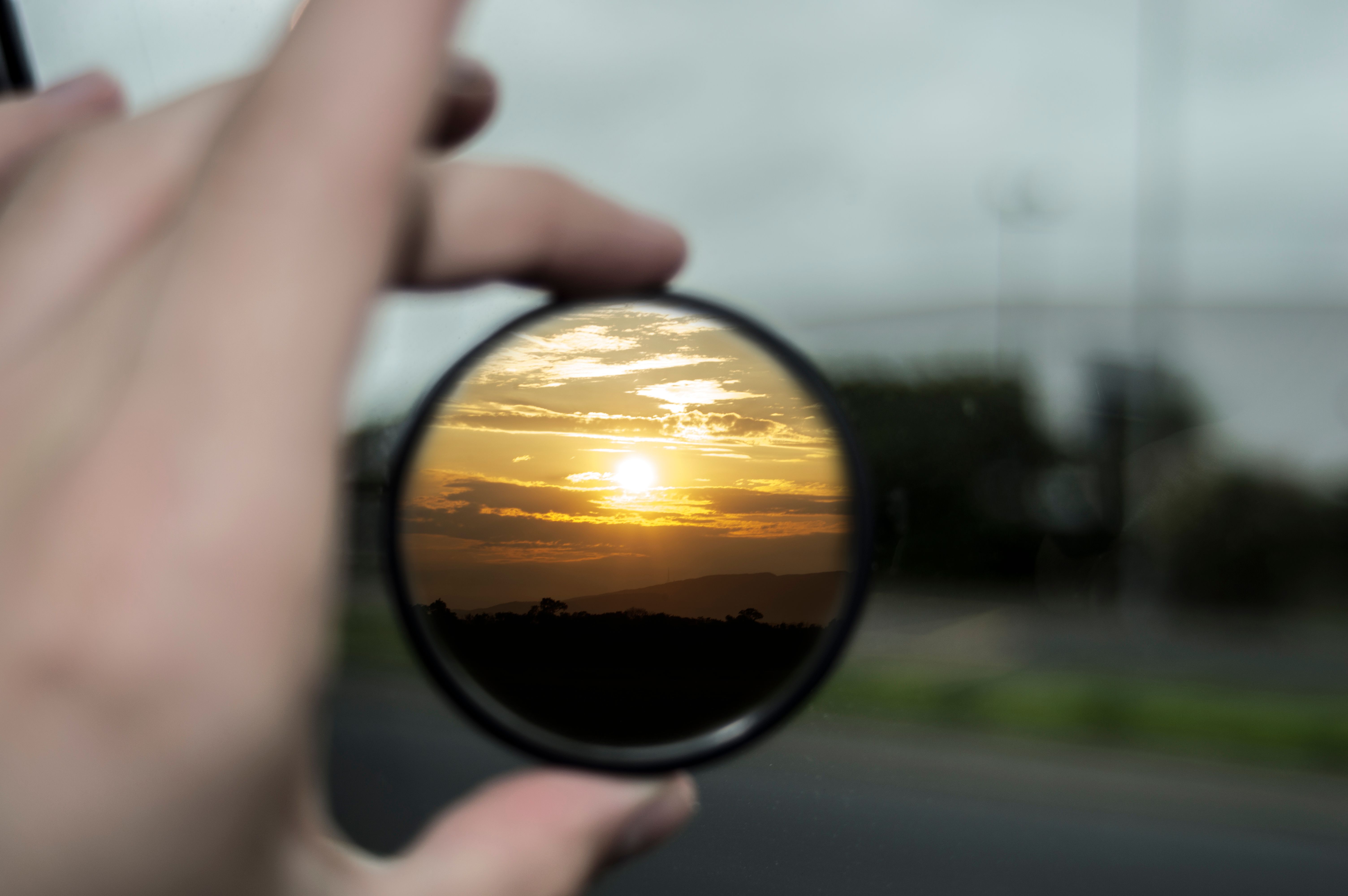 round-mirror-with-black-frame-free-stock-photo