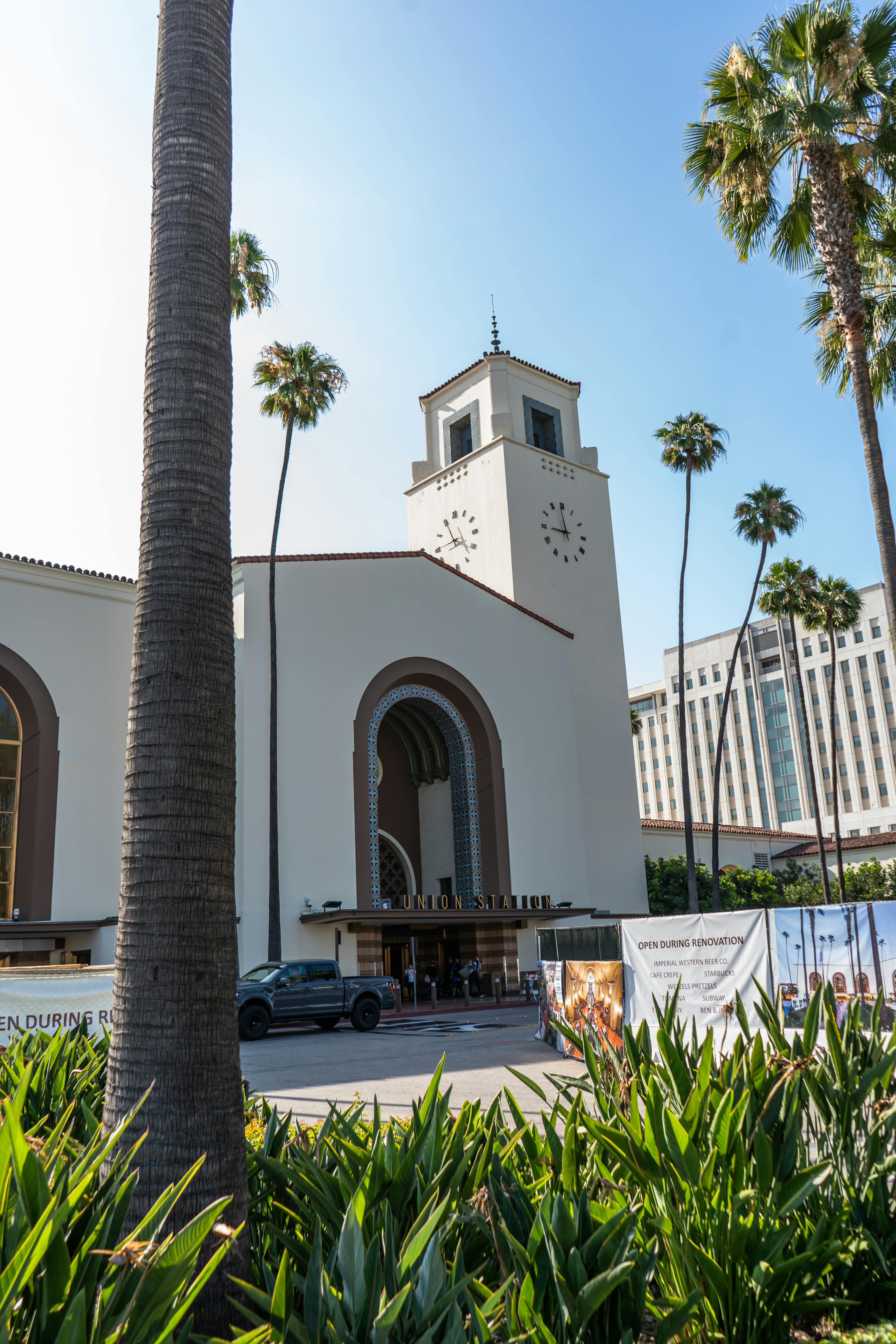 Modern Building Exterior With Clock Tower · Free Stock Photo