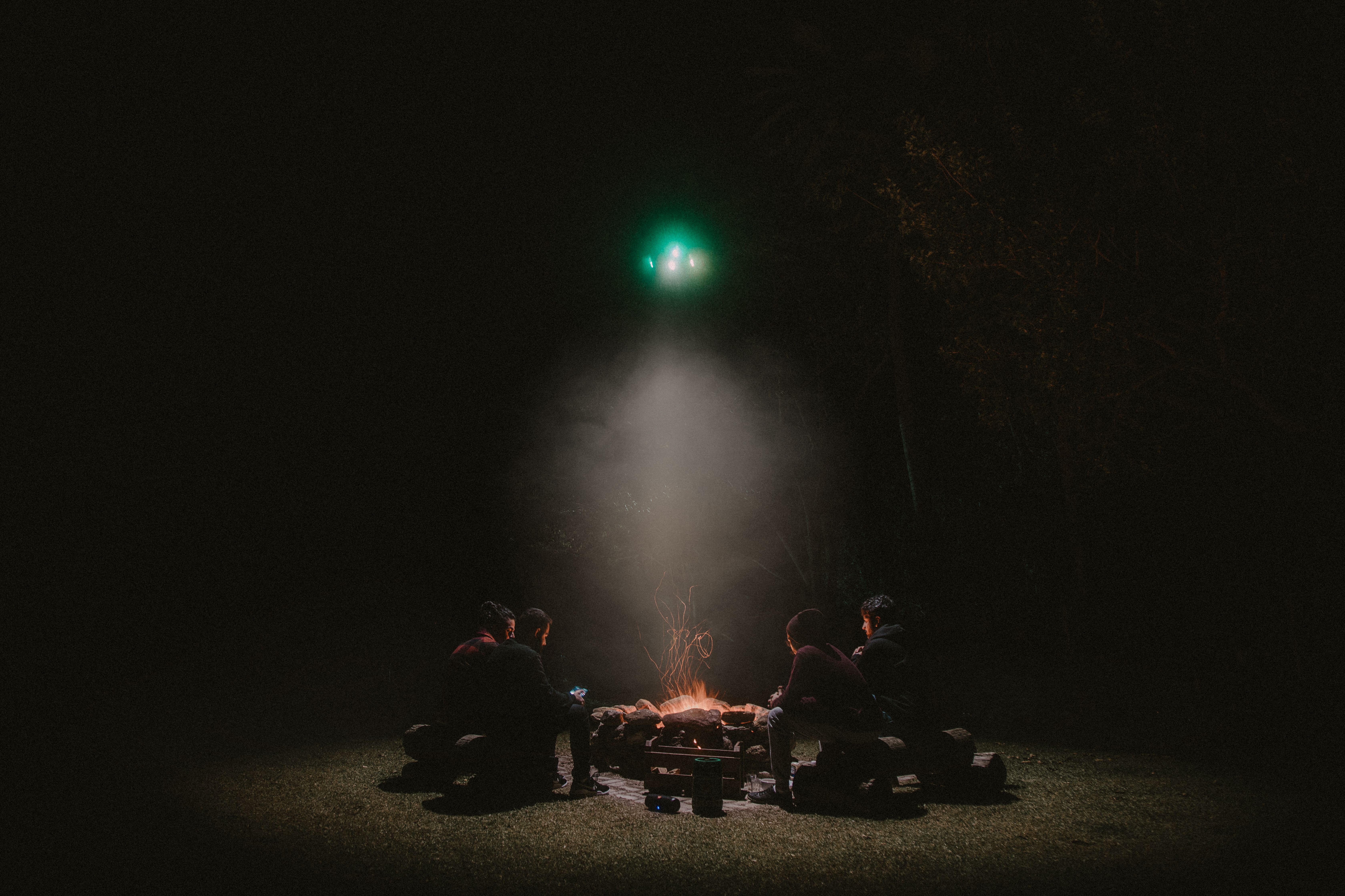 People Sitting Around the Bonfire · Free Stock Photo