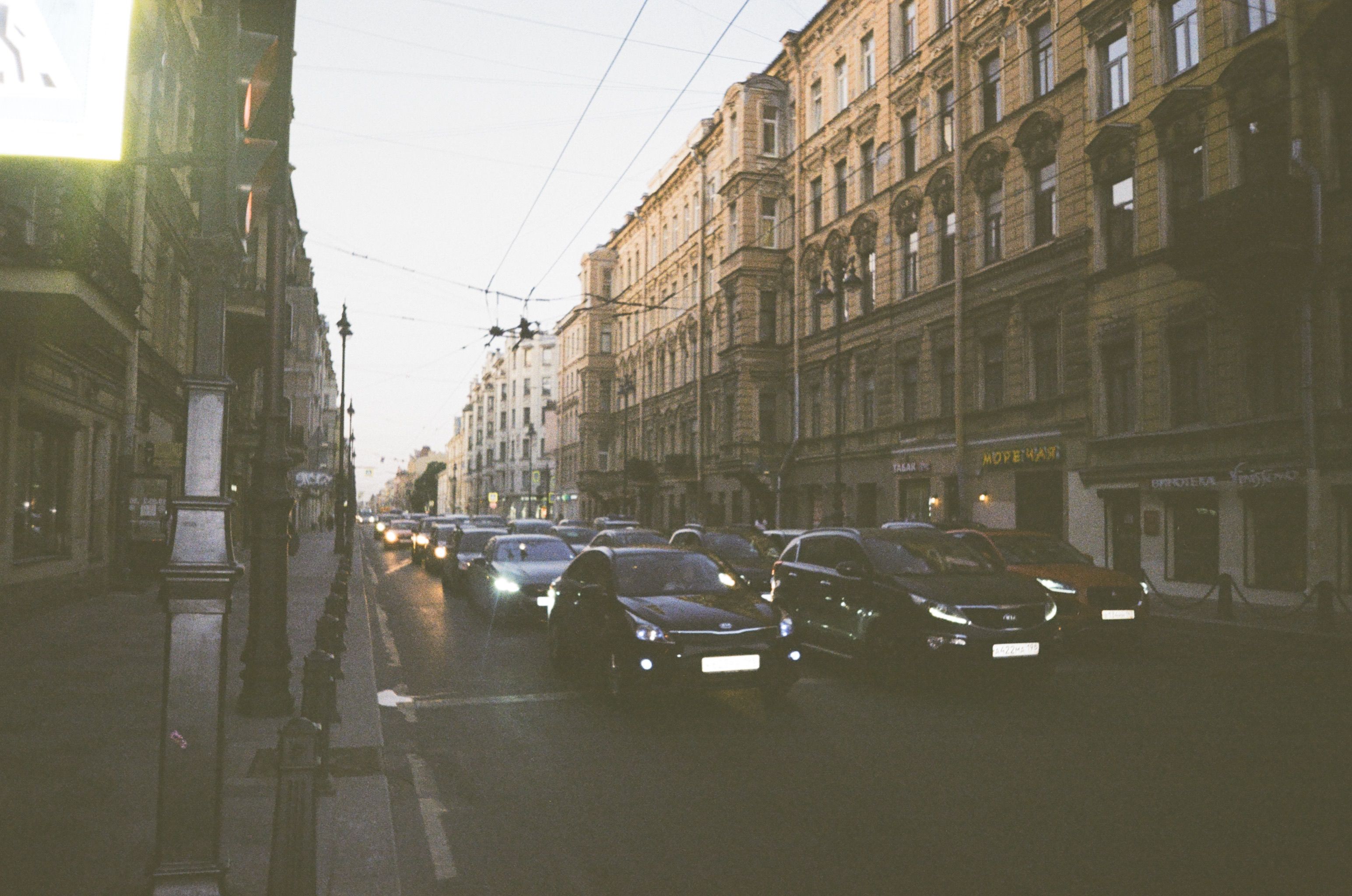 Cars Parked in Front of Building · Free Stock Photo