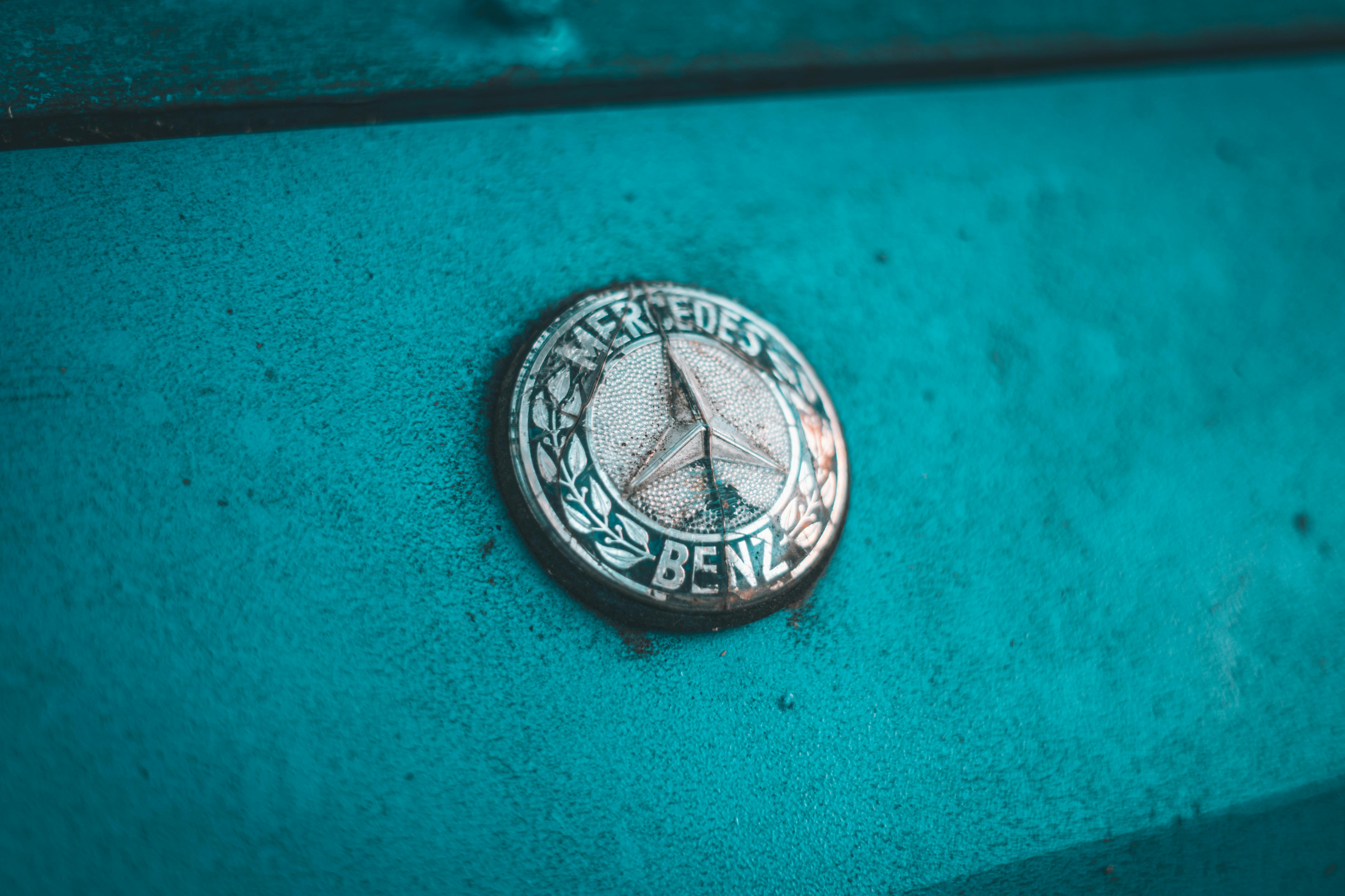 Black Mercedes-benz Building Under Blue and White Sky · Free Stock Photo