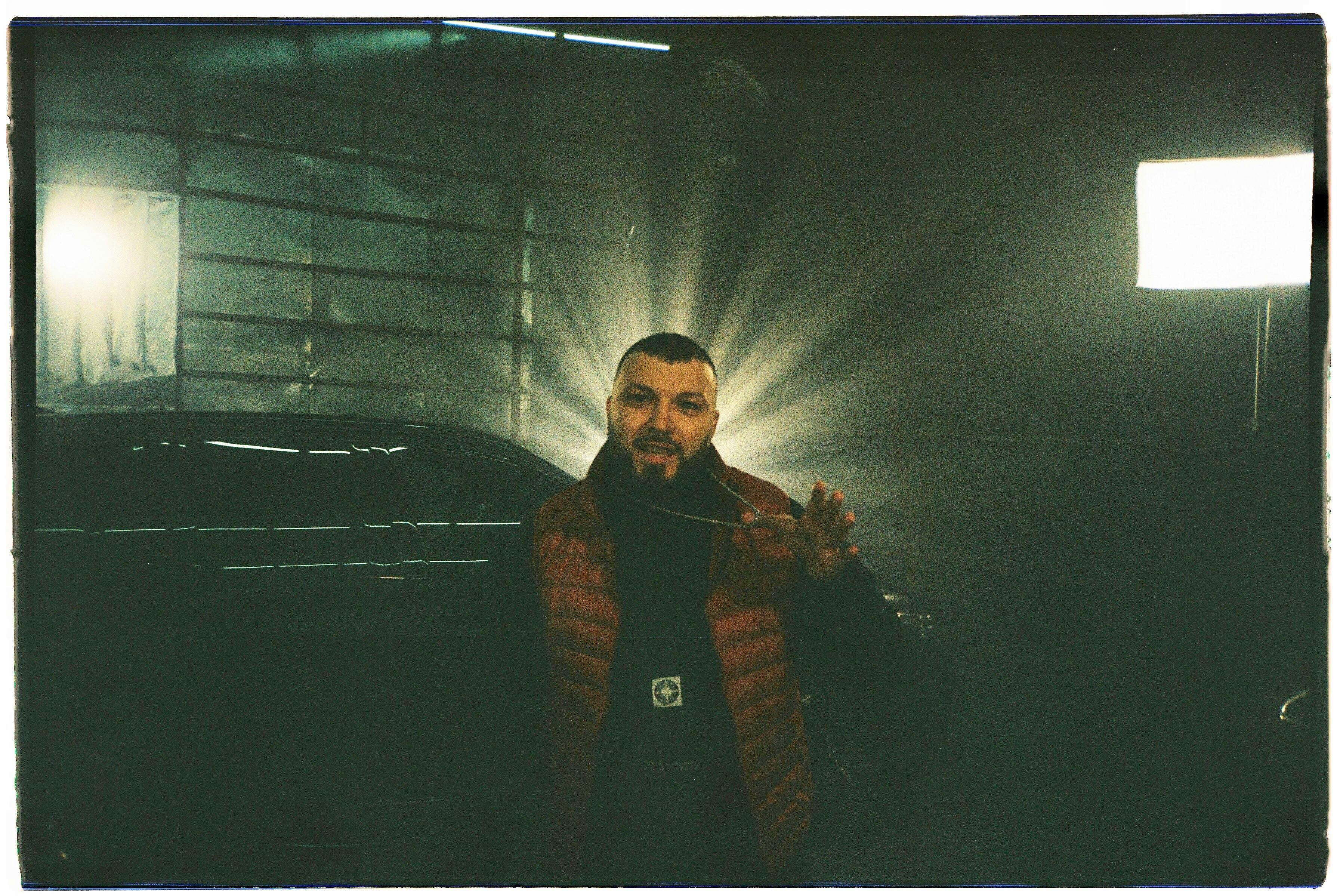 Bearded Rapper Bragging About Neck Chain · Free Stock Photo