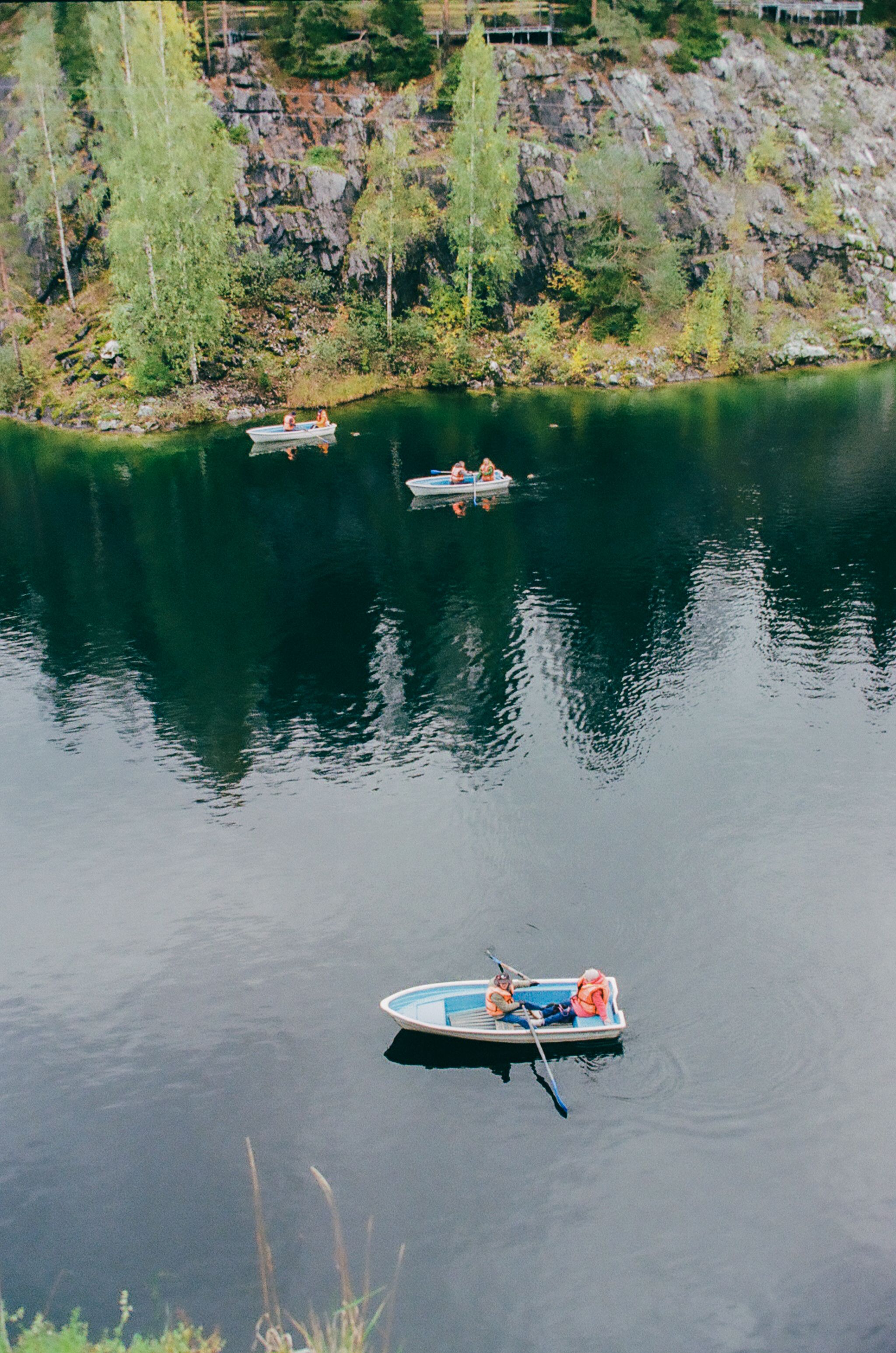People Rowing a Boat on the Lake · Free Stock Photo