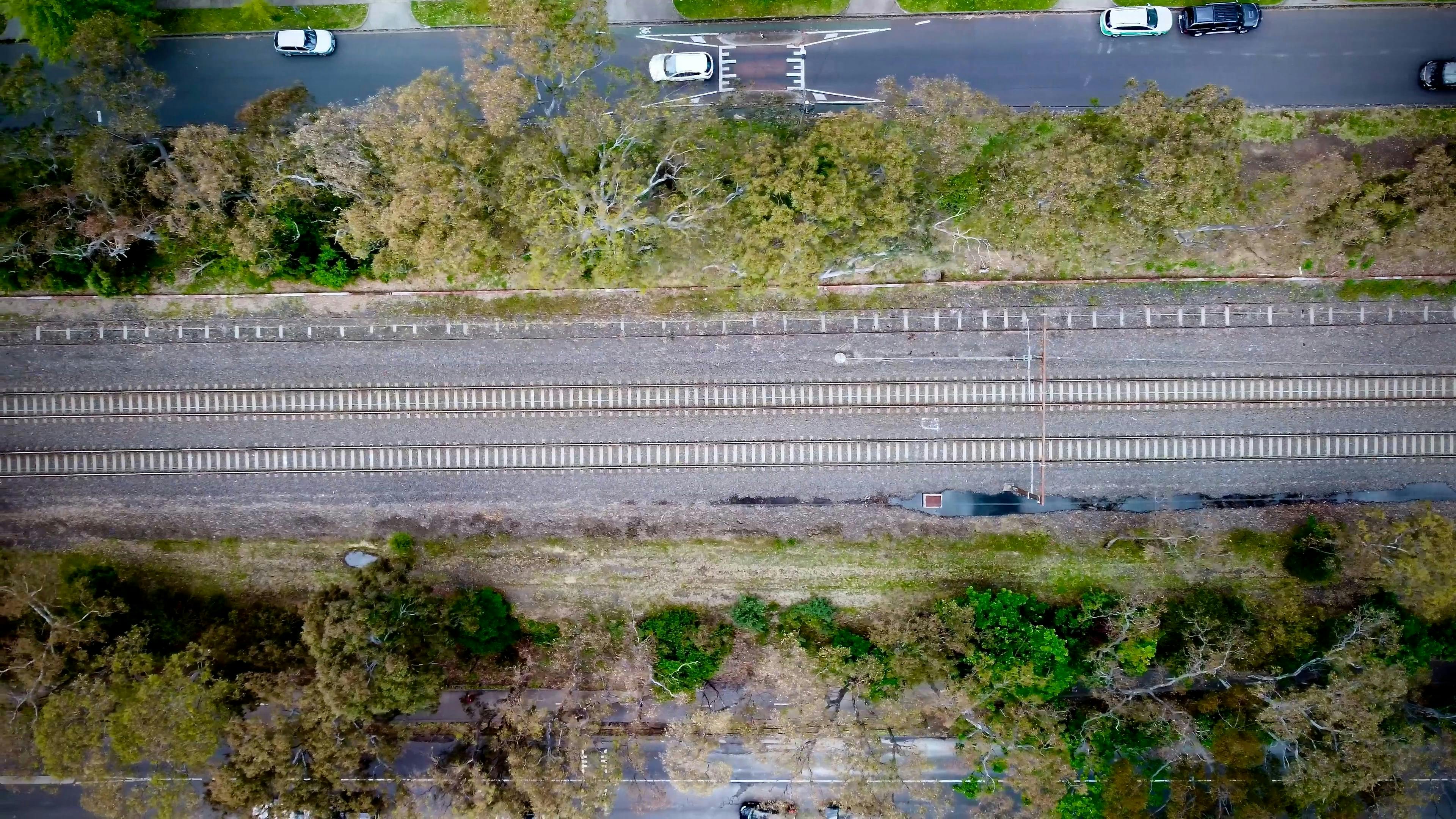 Overhead View of Traffic on Road and Tram Tracks Free Stock Video ...