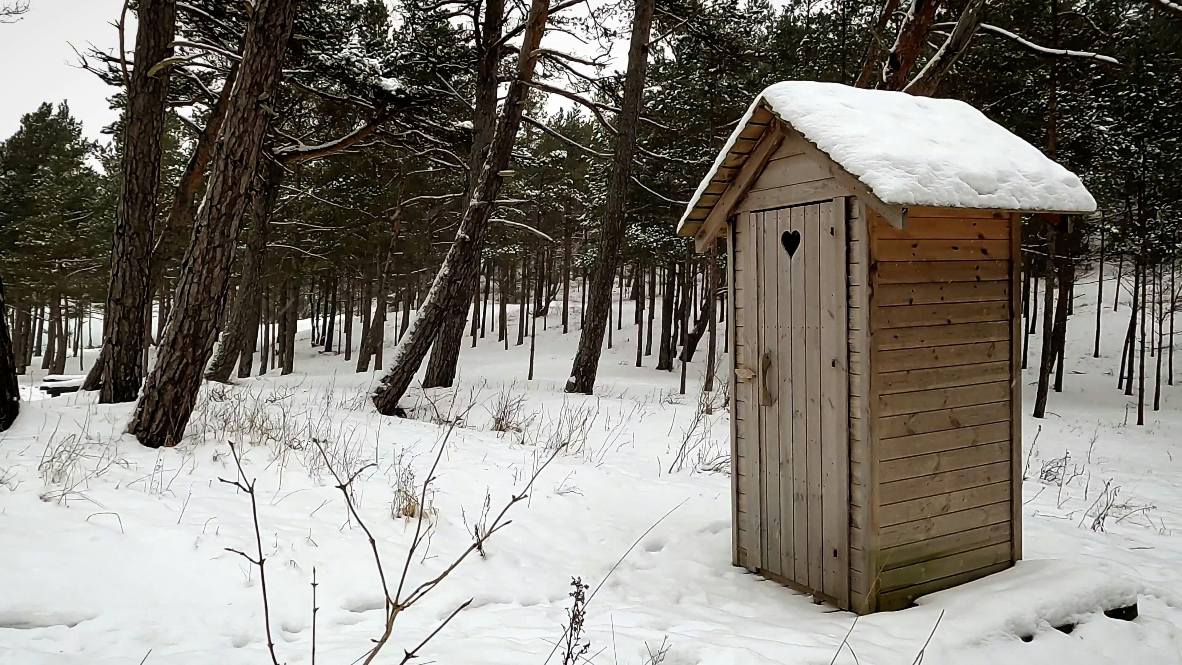 A Snow Covered Outhouse in the Woods Free Stock Video Footage, Royalty ...