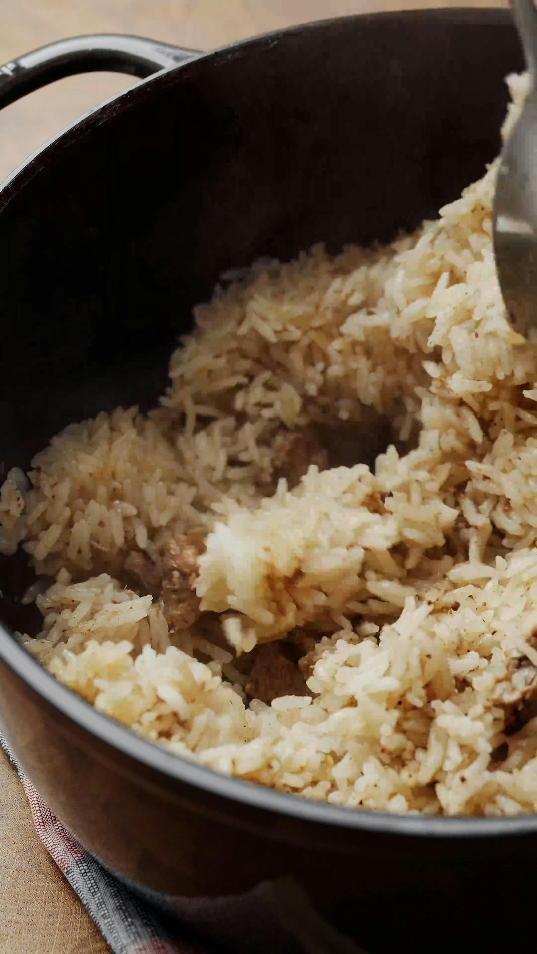 A Person Stirring Rice in a Pot Free Stock Video Footage, Royalty-Free ...